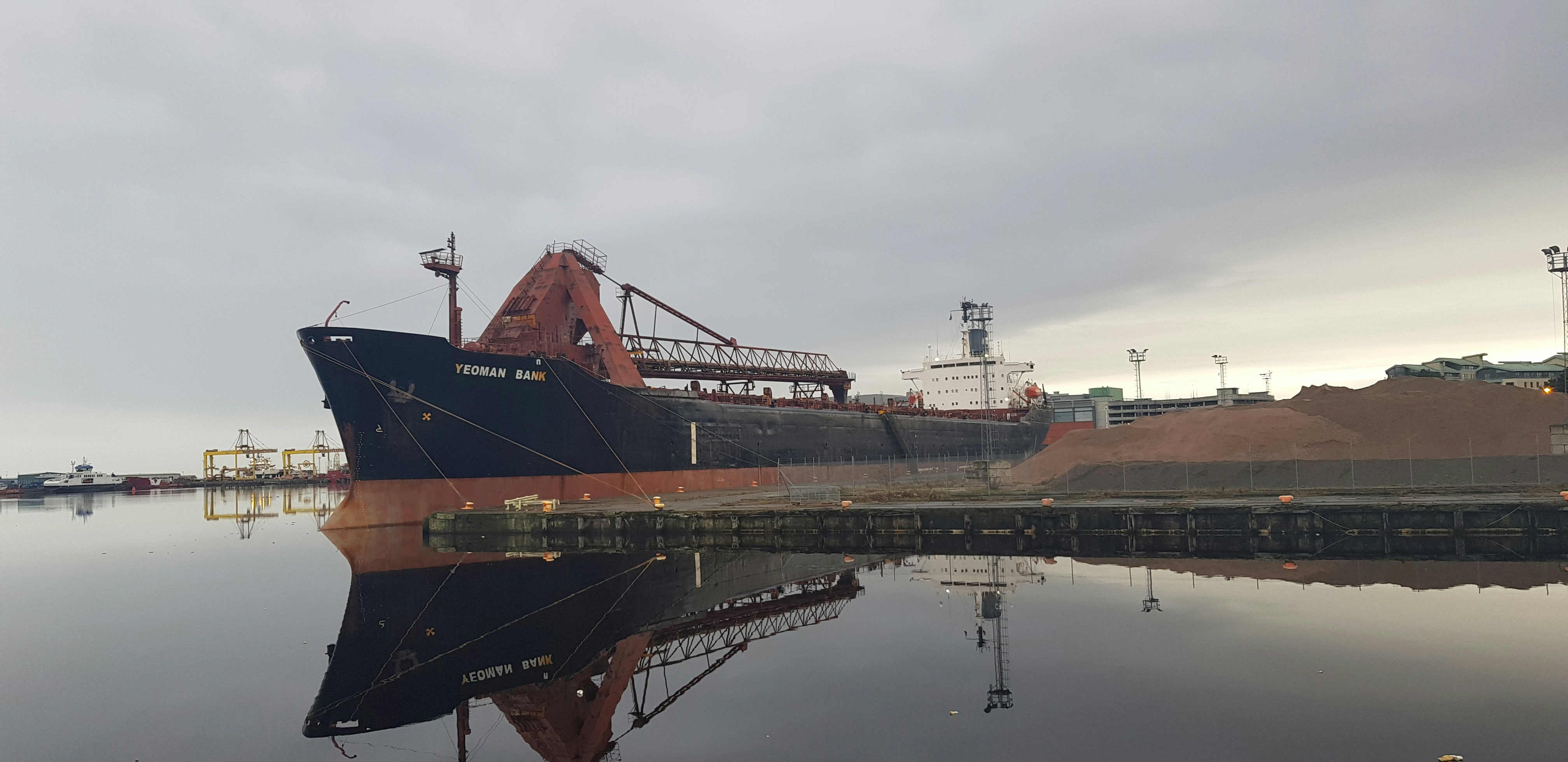 Harbor Behemoth: A Silent Reflection on Still Water