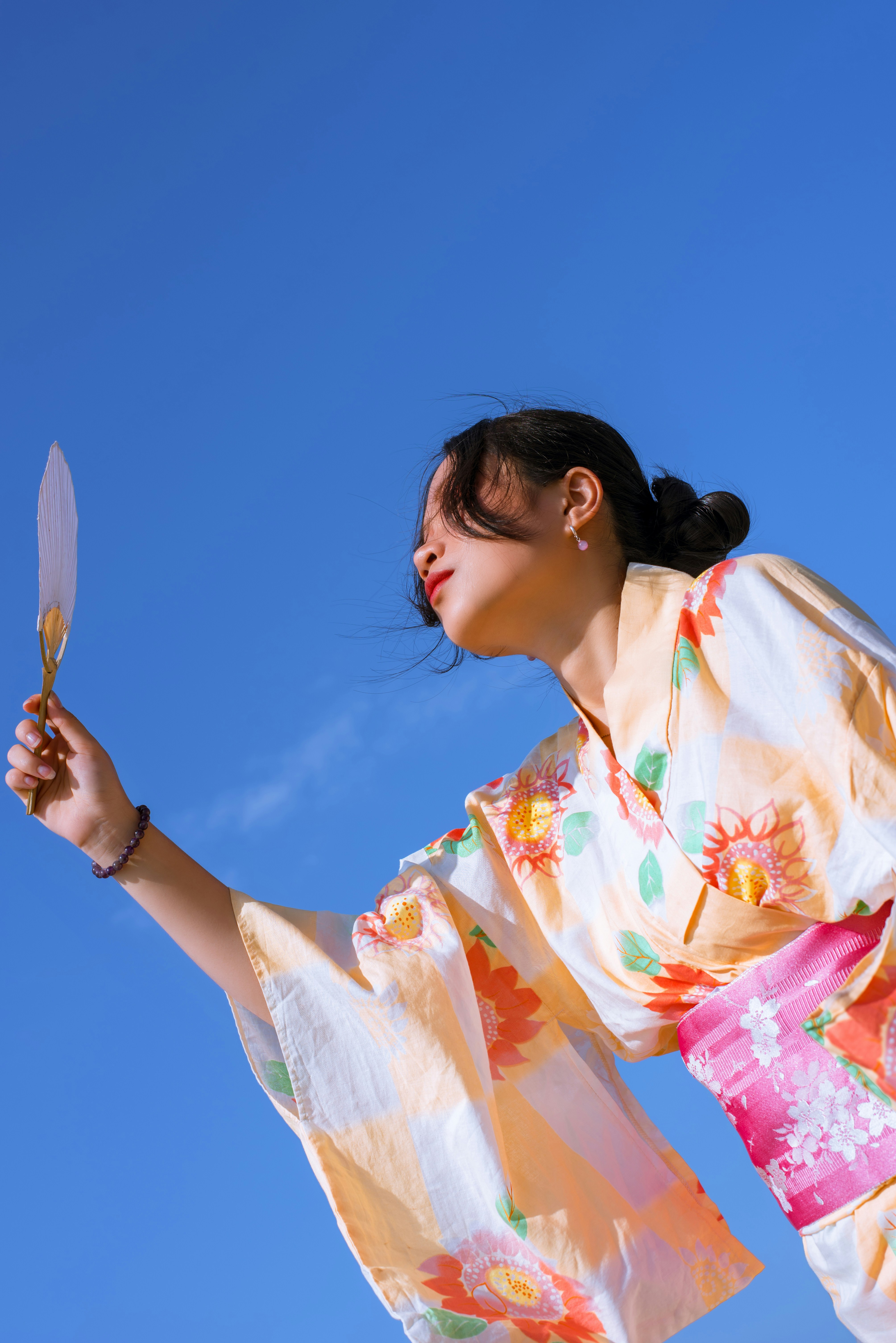 Sunlit Silk: A Portrait in Warm Petals and Sky