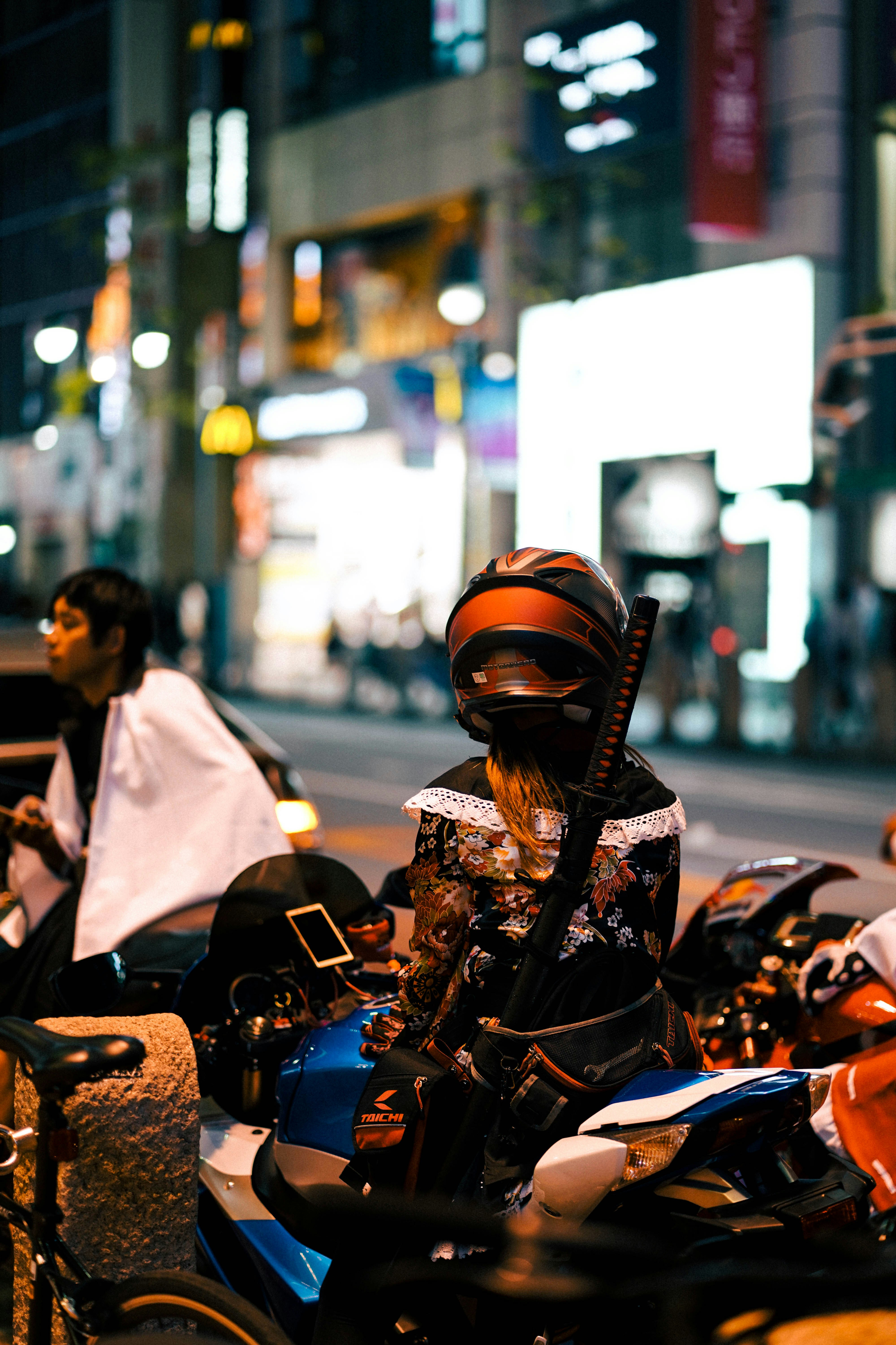 Neon Night Rider: Backview Among Urban Motorcycles