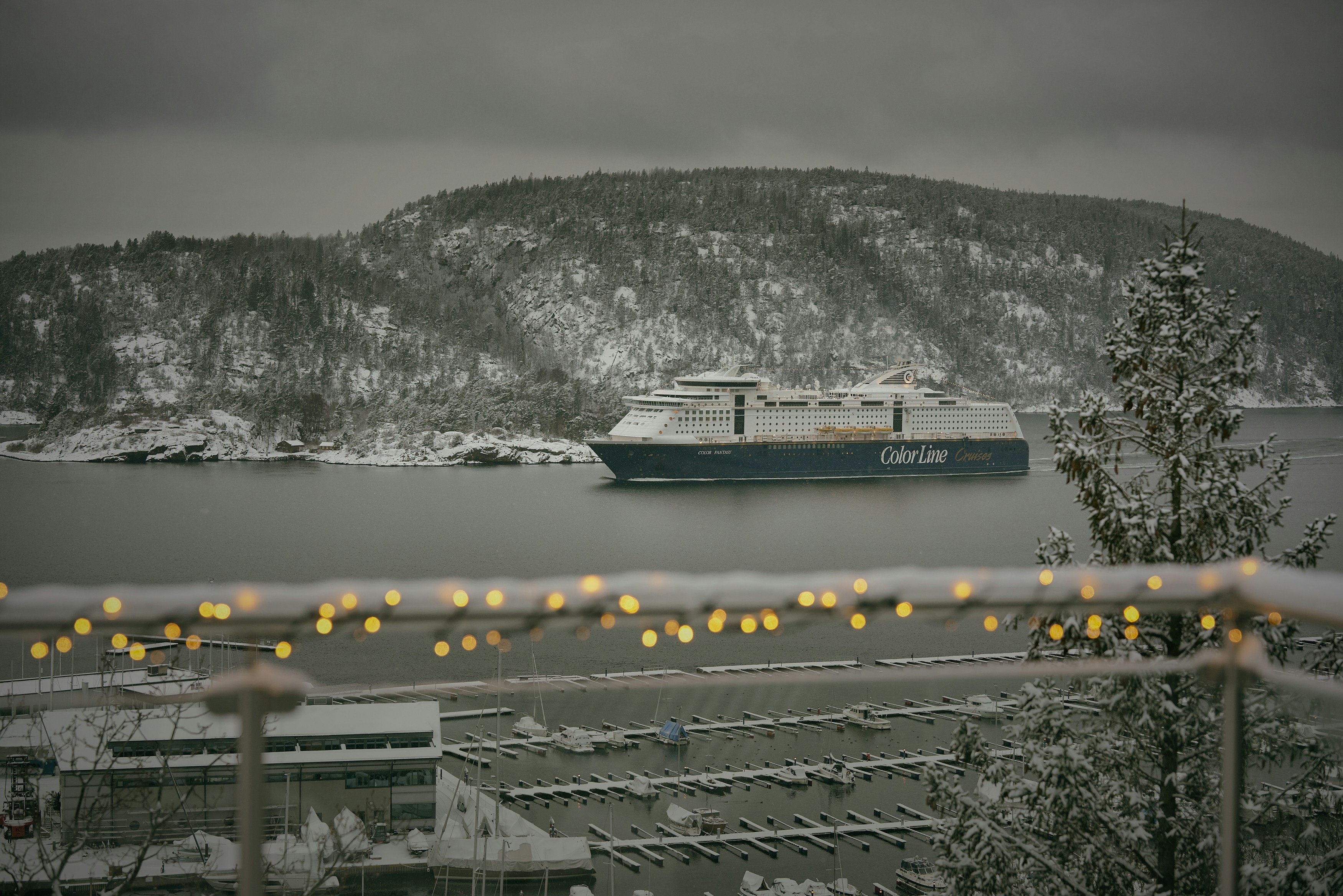Quiet Giants in a Snowbound Fjord: The Color Line Ferry