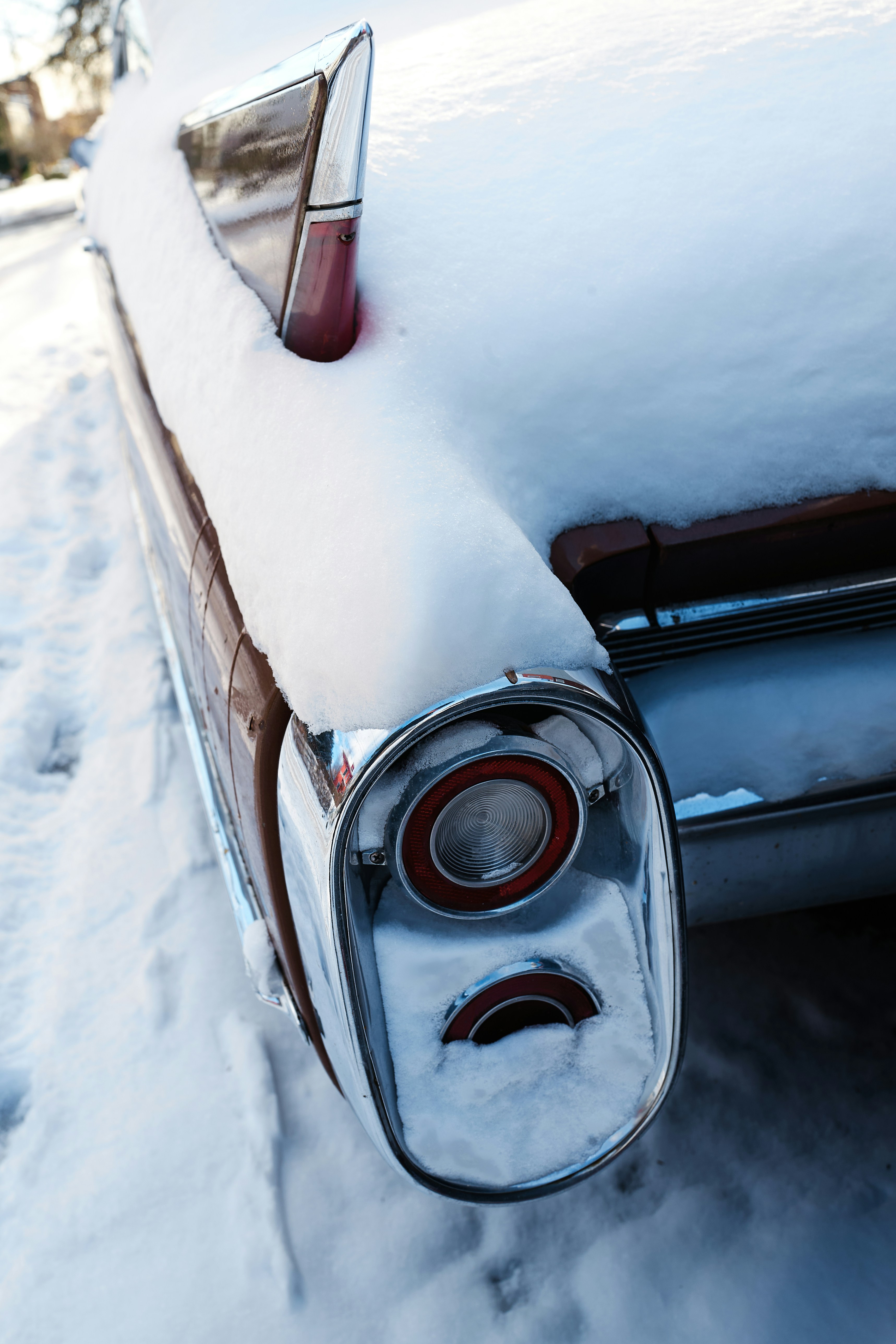A car is covered in snow and has a face drawn on it photo – Free ...