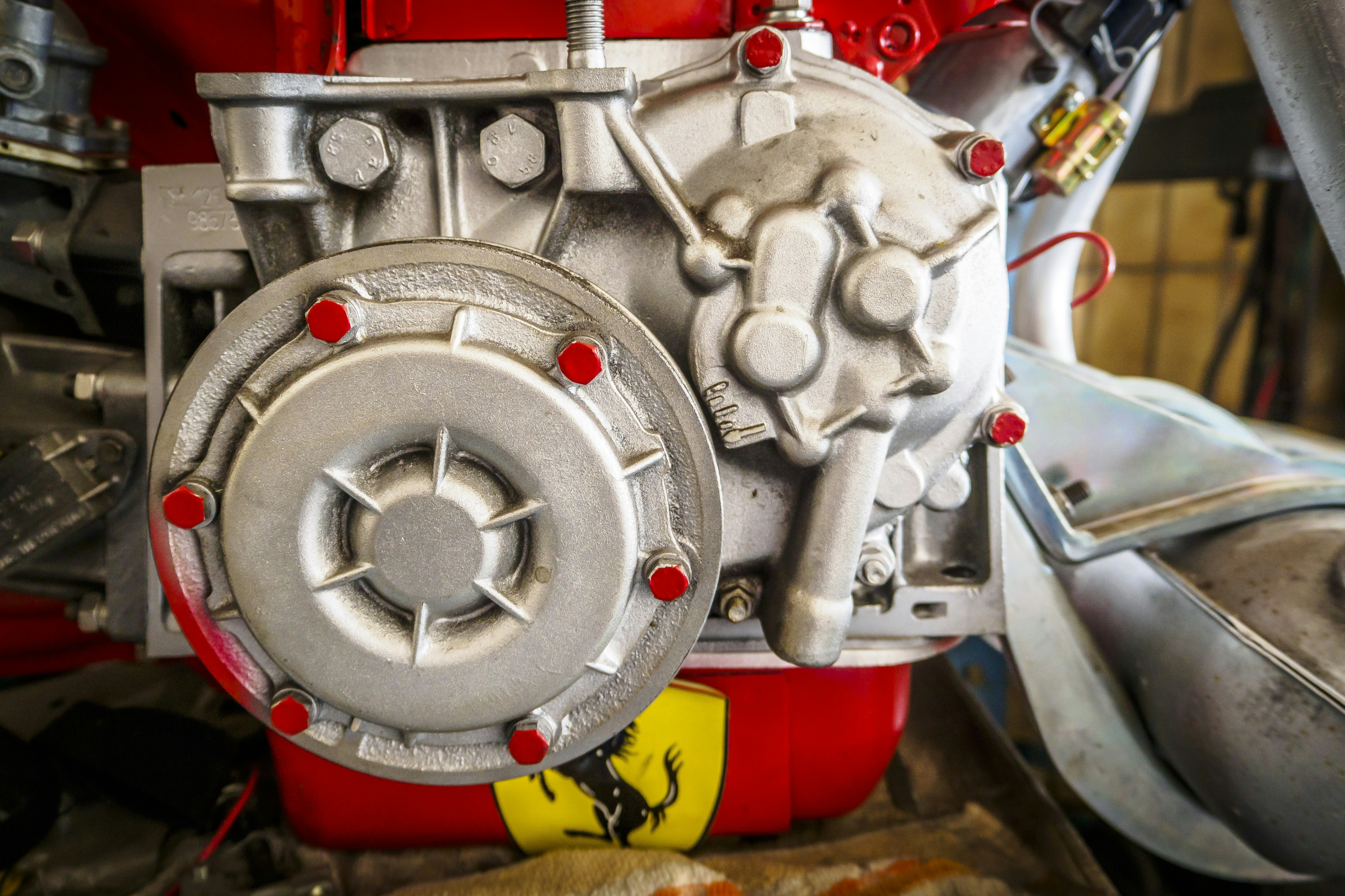A close up of a red and silver engine photo – Free Solingen Image on ...