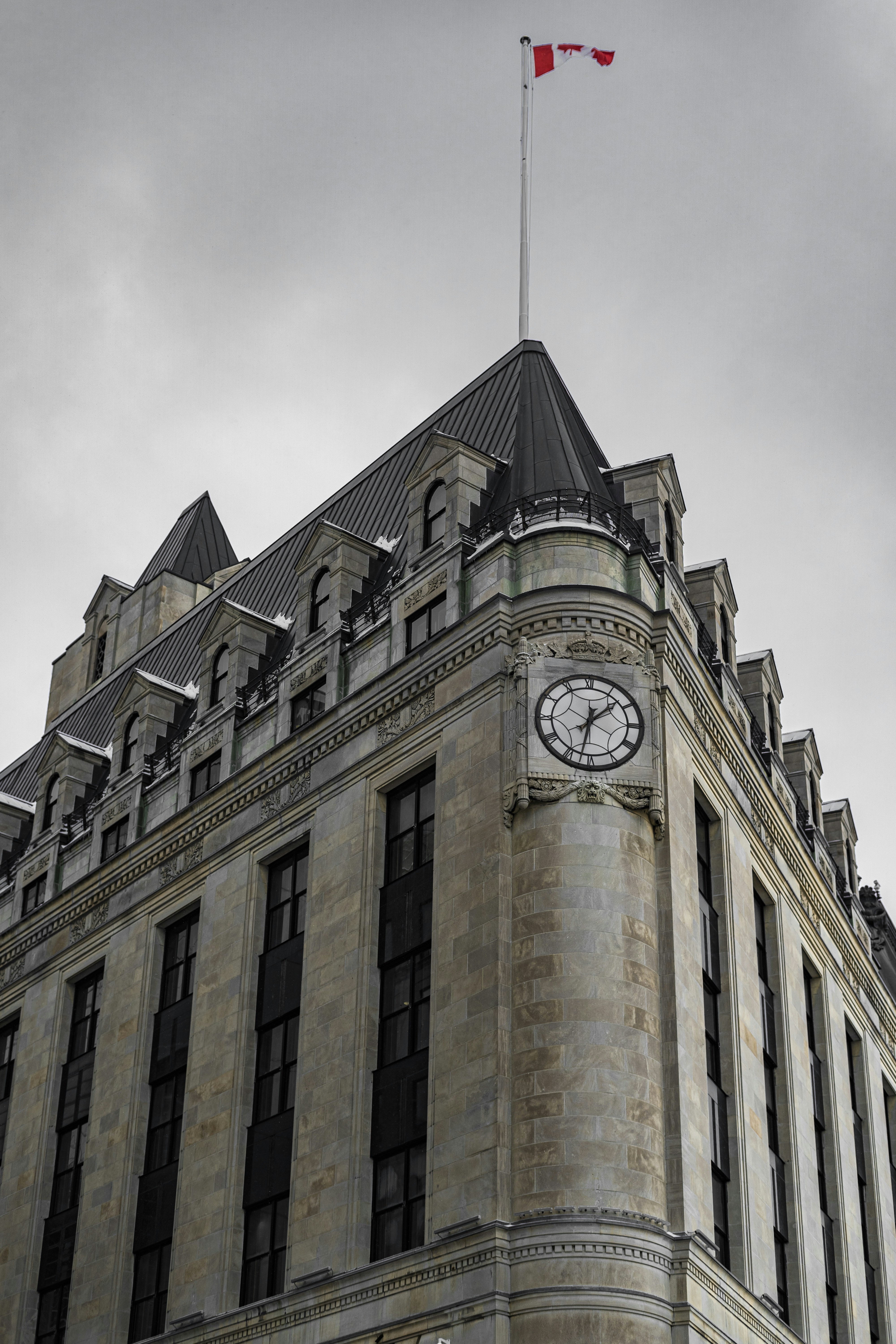 Corner Clocktower: Stone Facade Reaching into the Grey