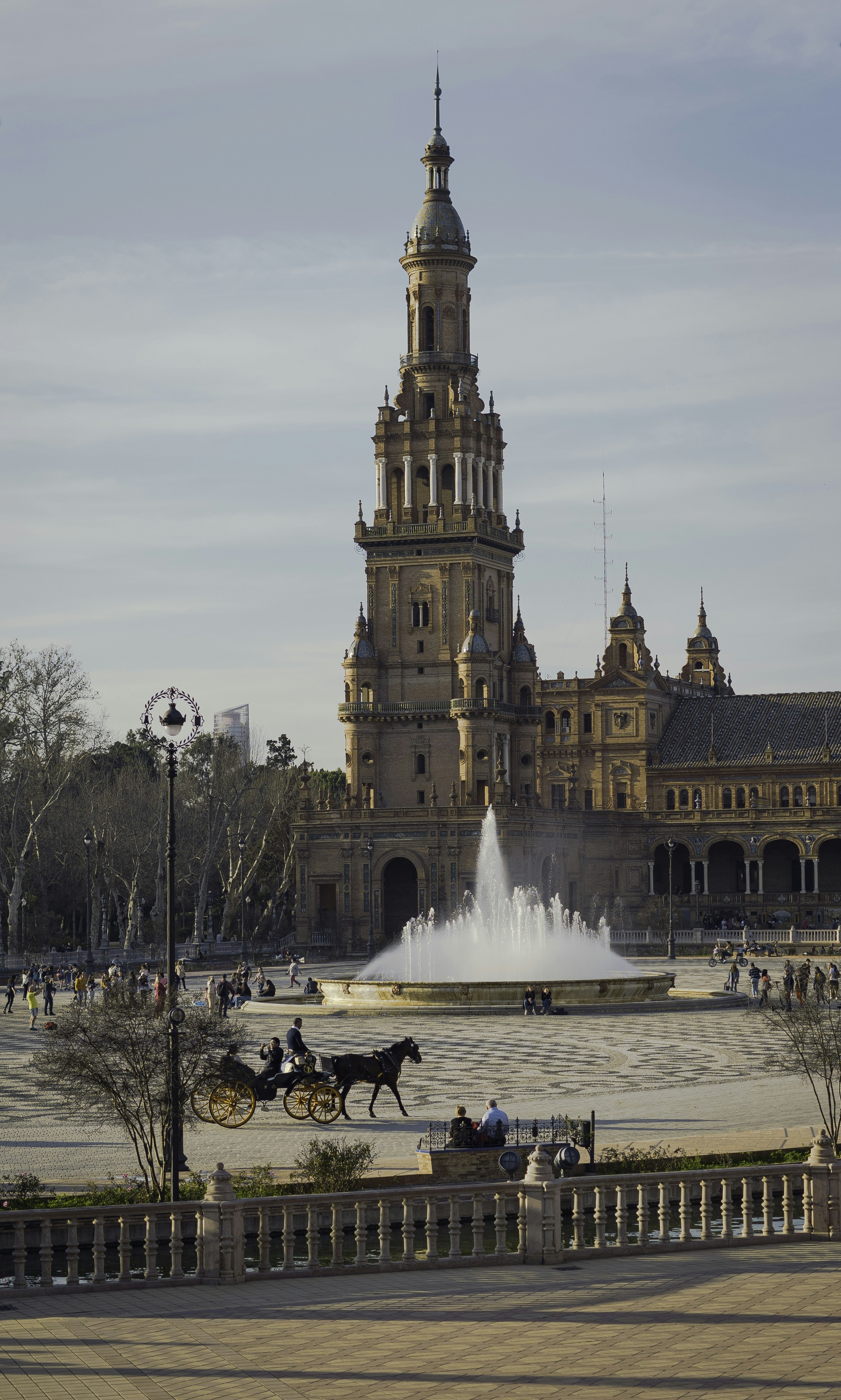 Seville's Plaza de España: The Central Tower Rising Over a Circular Fountain