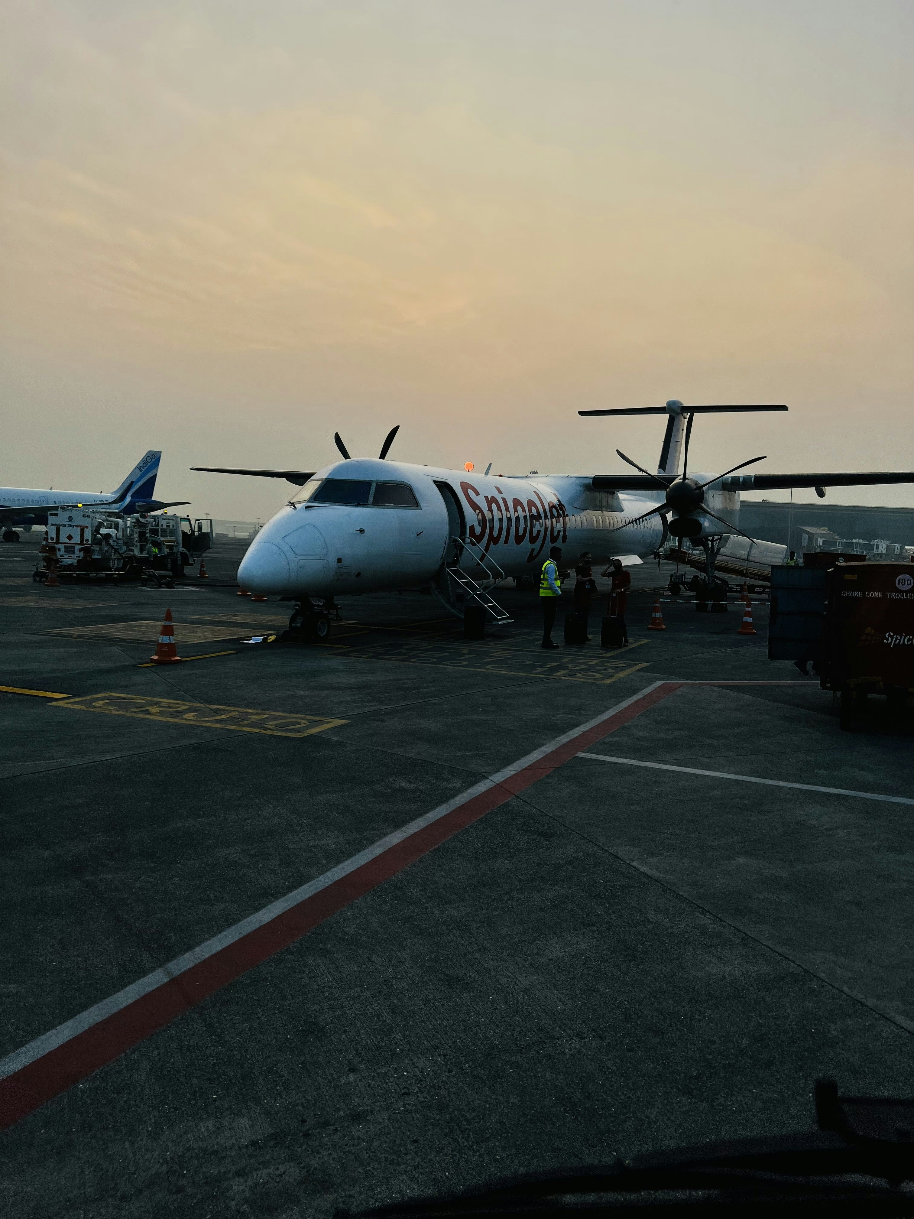 Dusk on the Apron: SpiceJet aircraft stationed under a peach sky