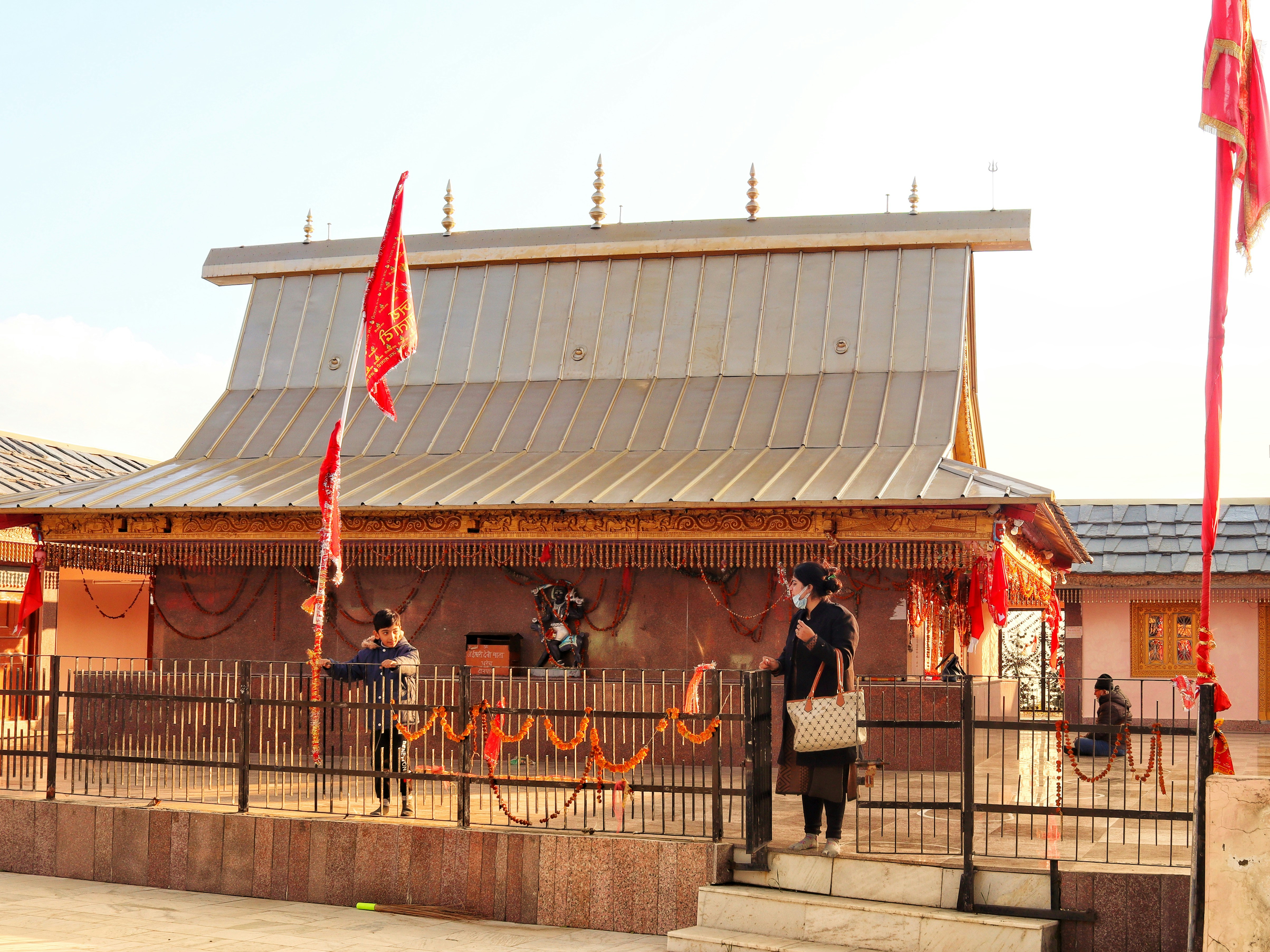 Red Prayer Flags and Quiet Courtyard: A Temple Visit