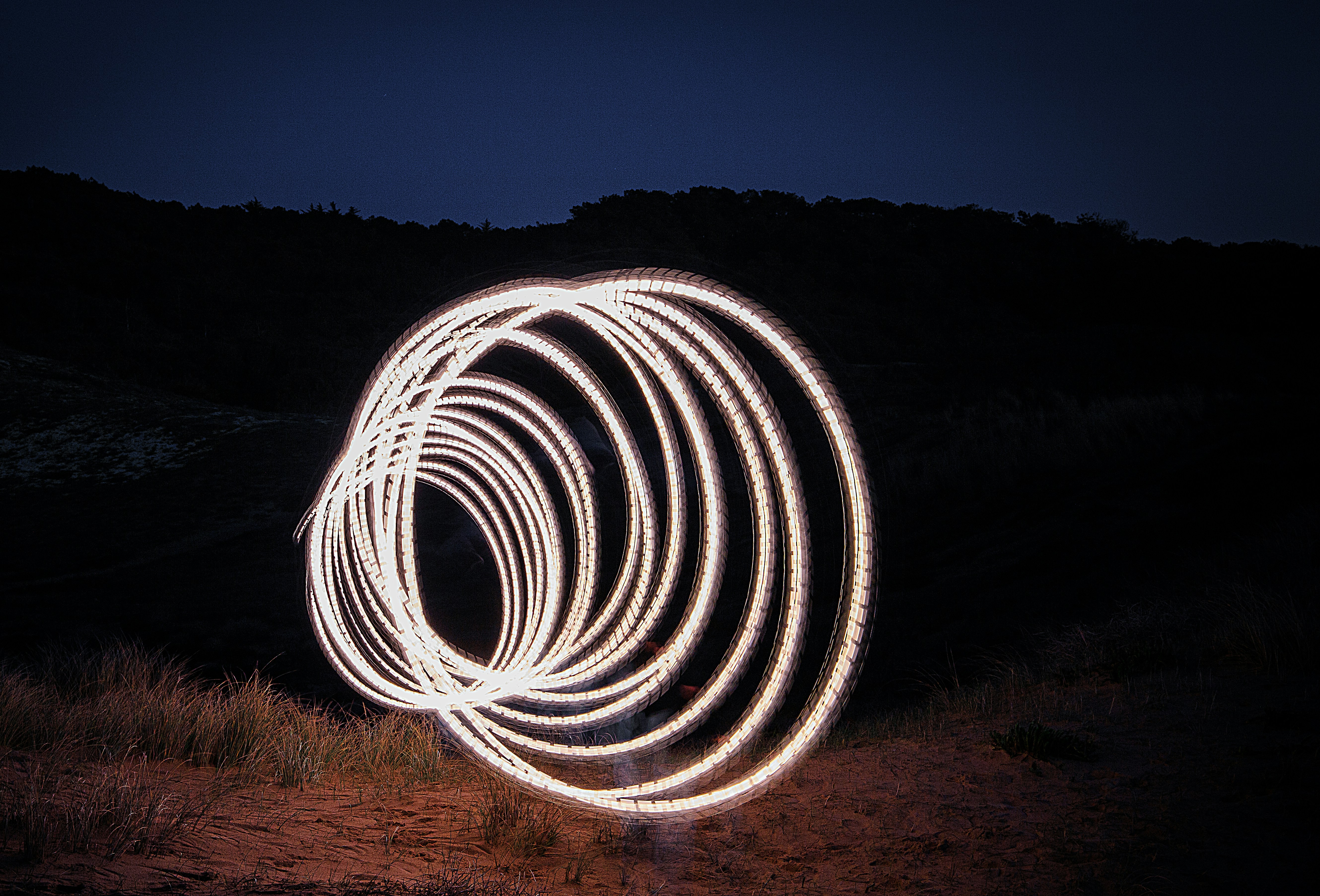 A long exposure photo of a circular light painting photo – Free Coil ...