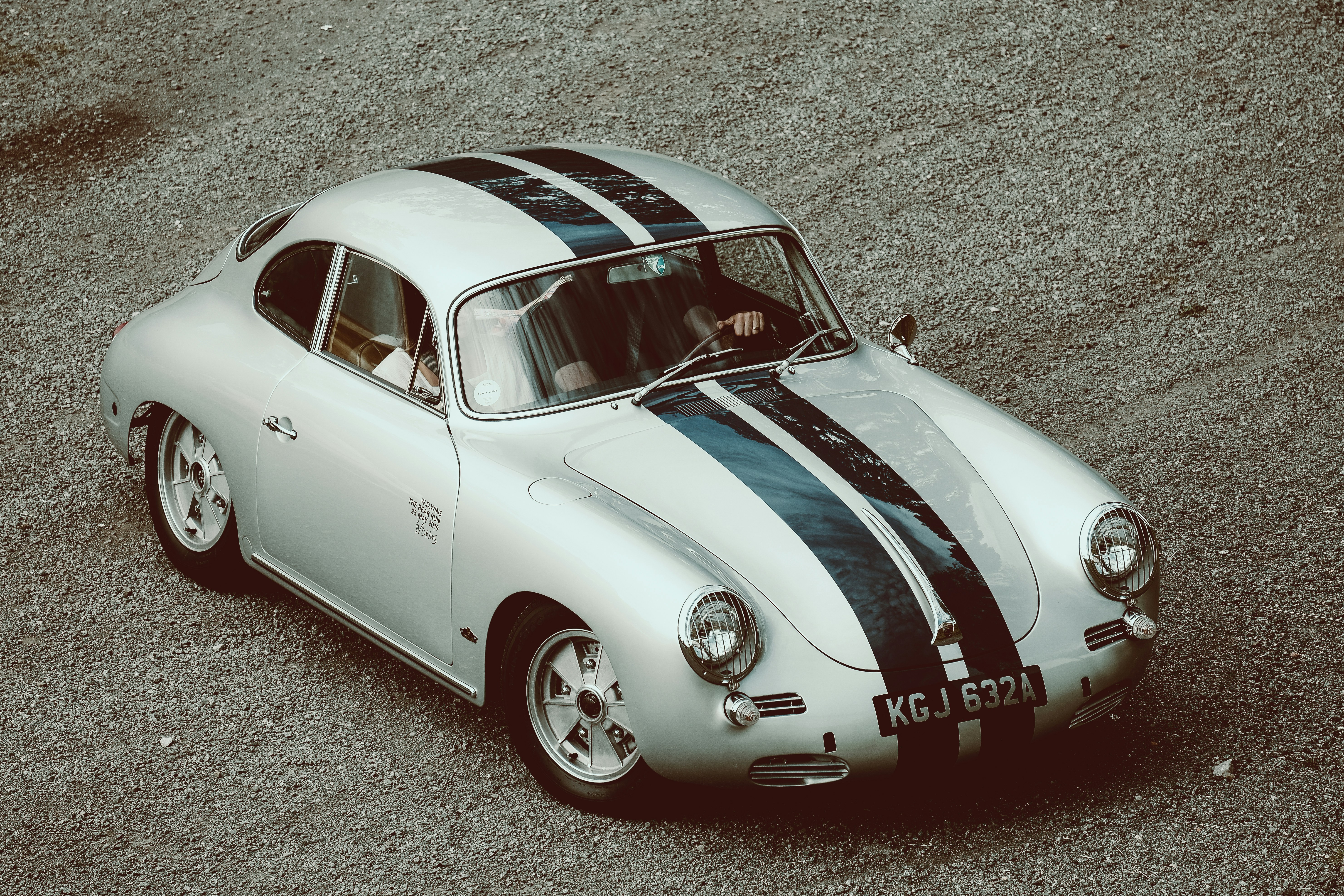 Stripe-Lined Classic: Aerial View of a Gleaming Vintage Racer