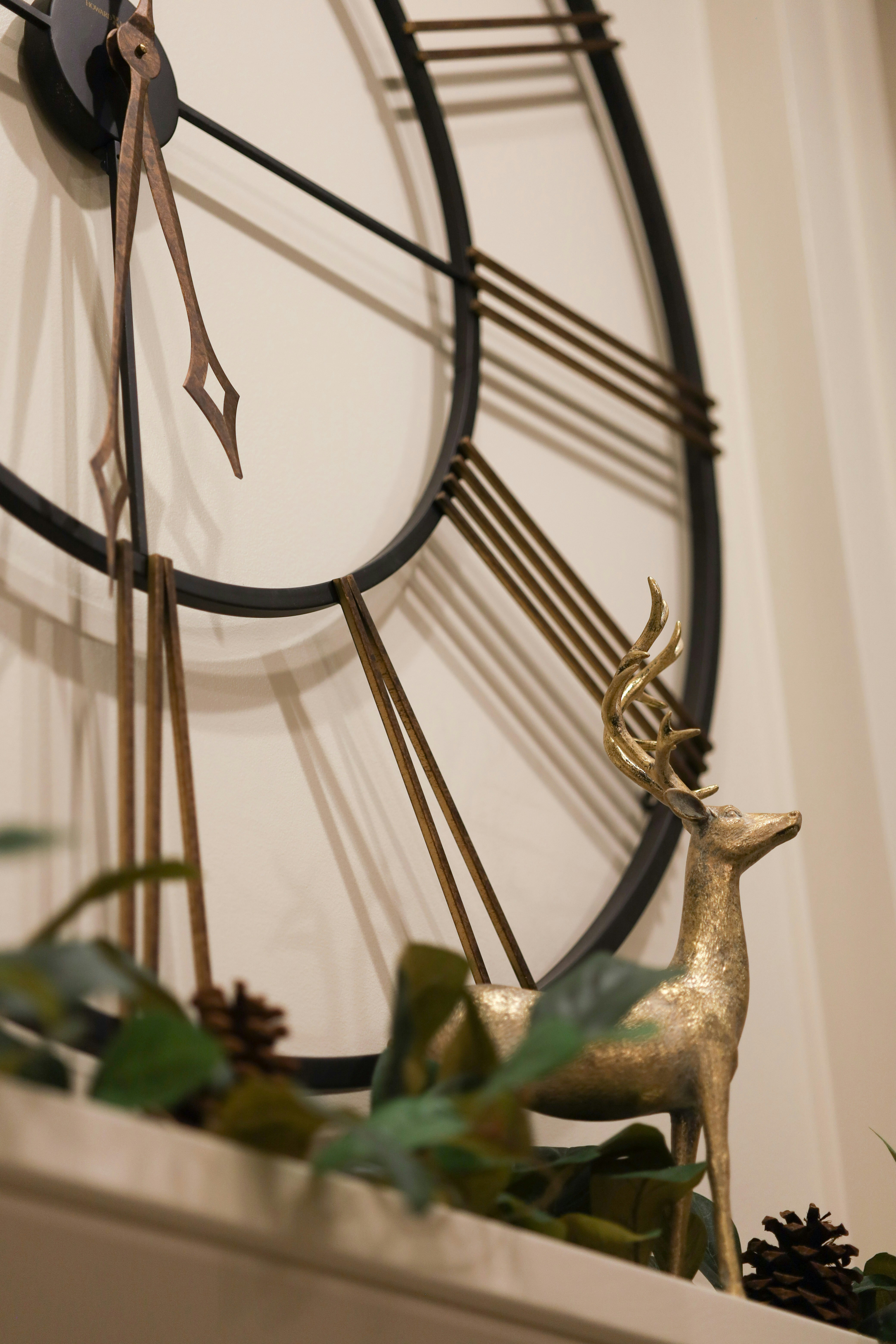 Brass Stag Beneath Time: A Quiet Mantel Composition