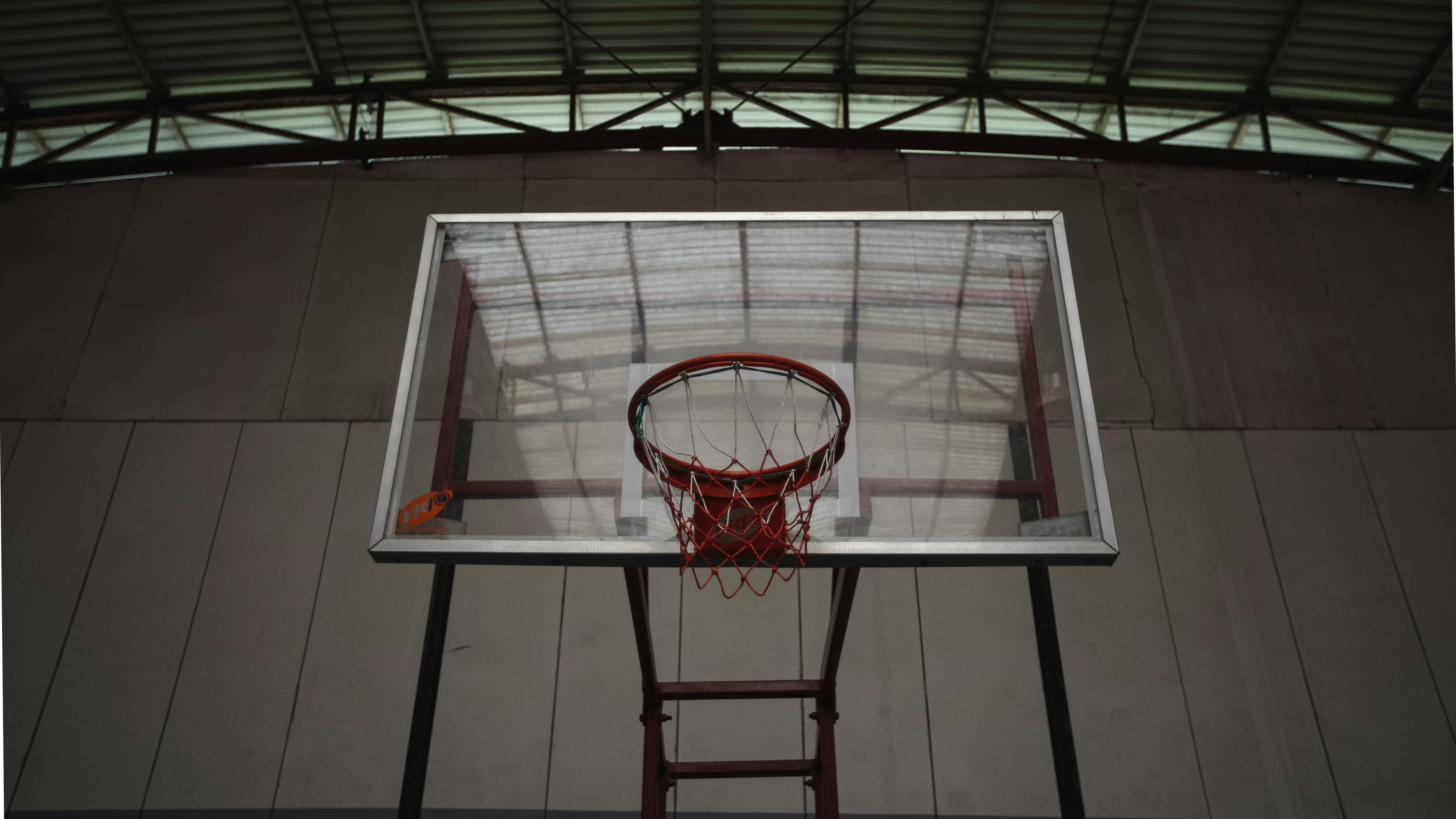 A basketball hoop with a basketball inside of it photo – Free ...