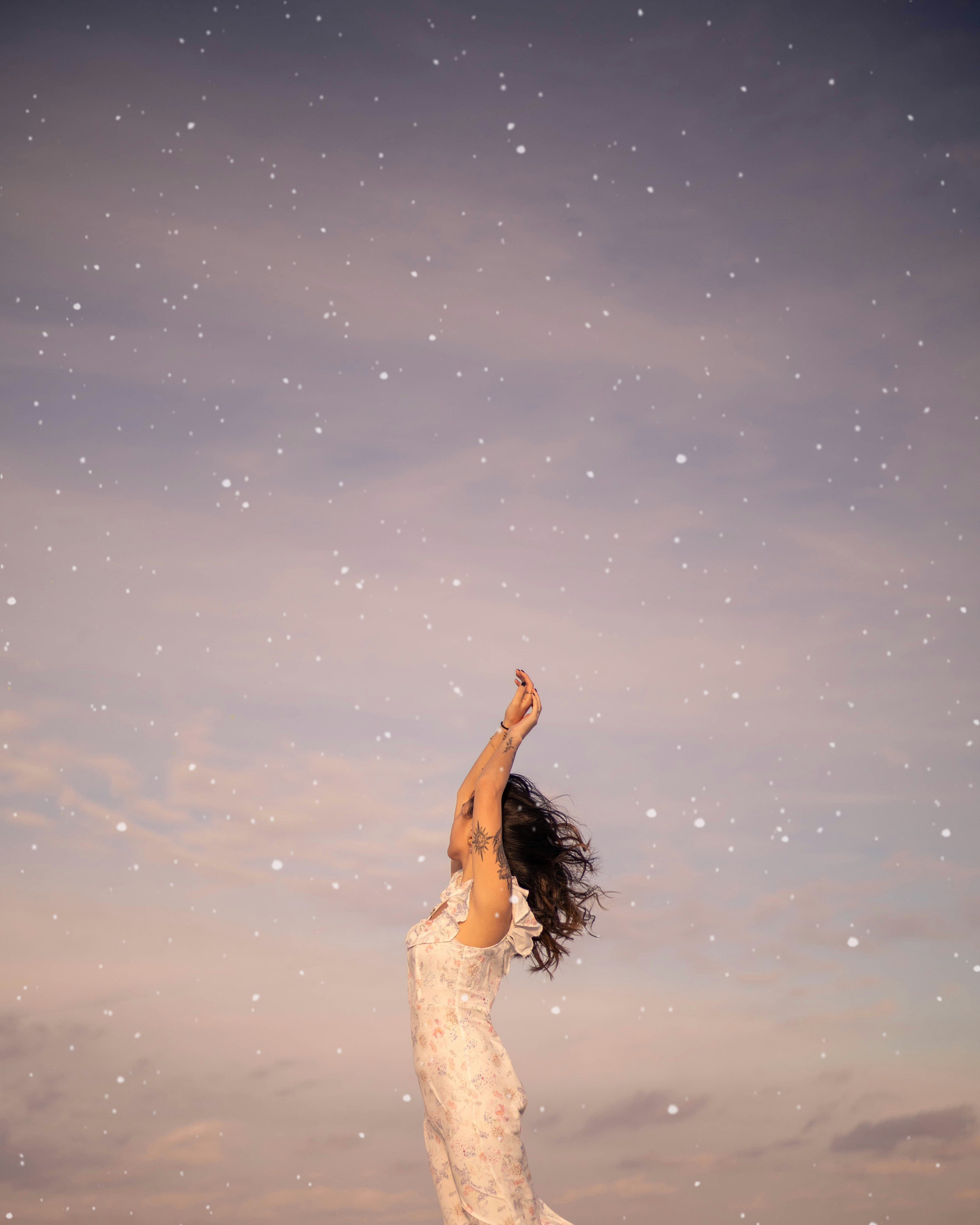 Girl Reaching Up To The Sky
