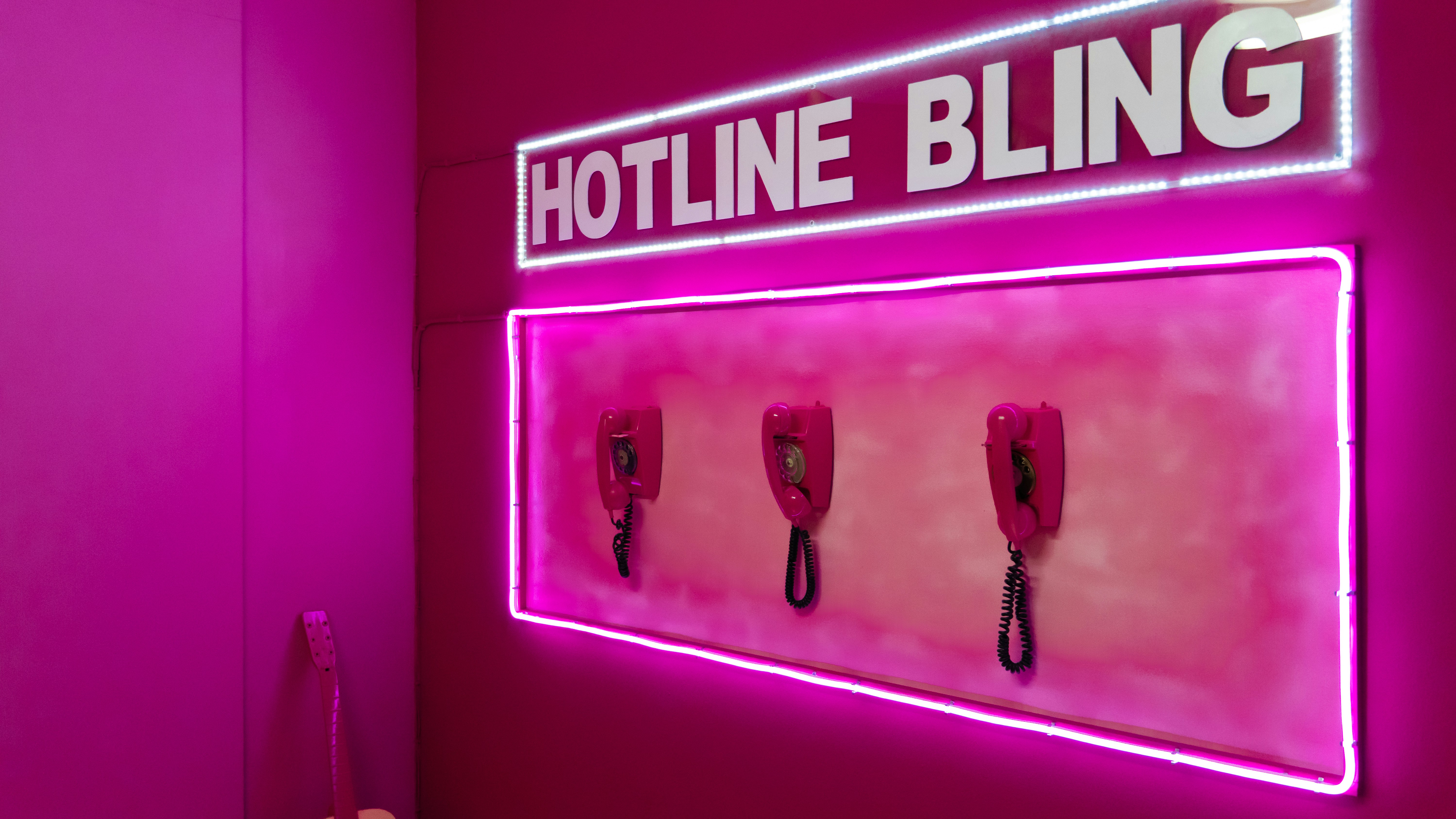 A neon sign that says hotline bling on it photo – Free Selfie house ...