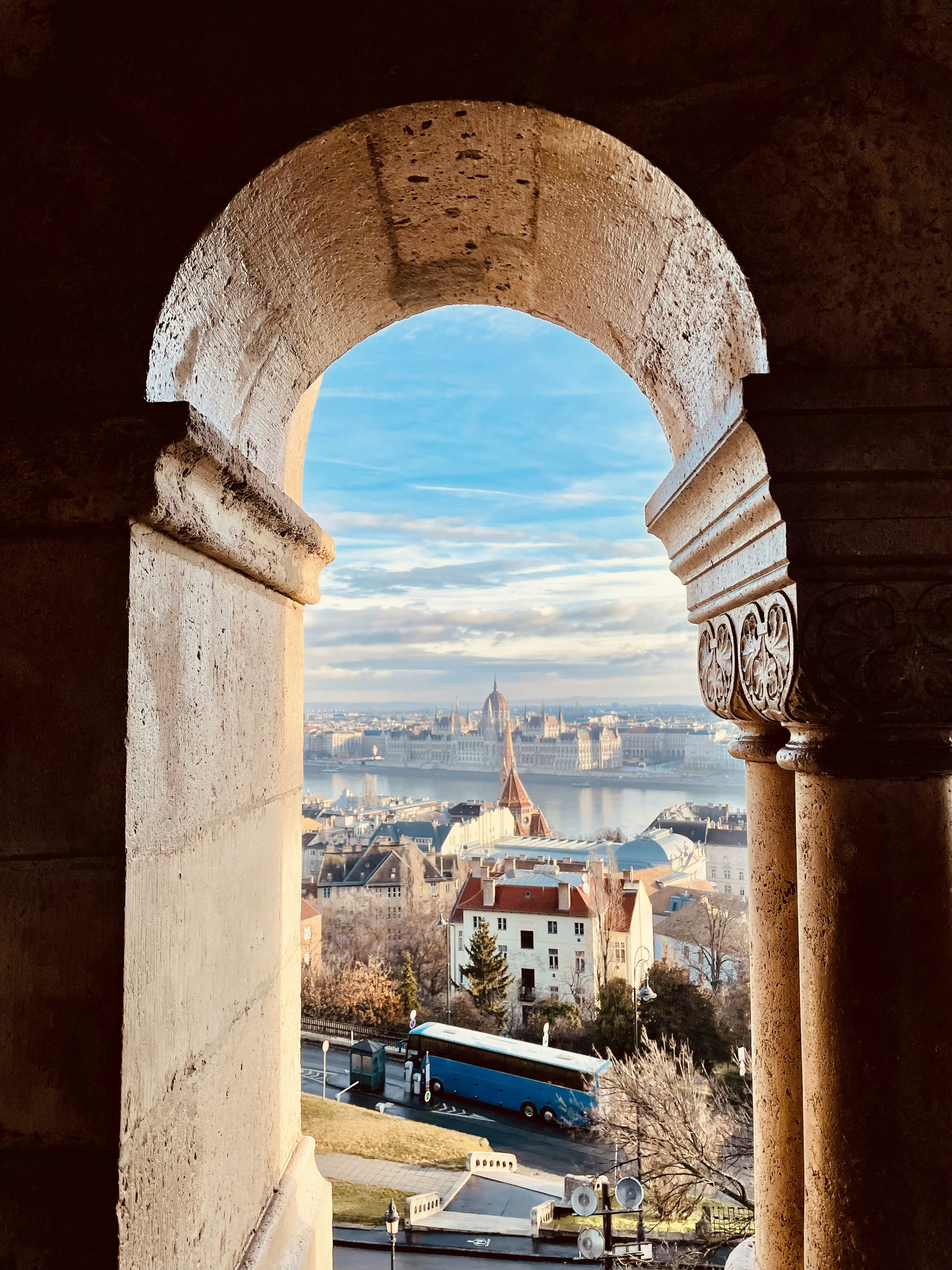 a view of a city through an archway