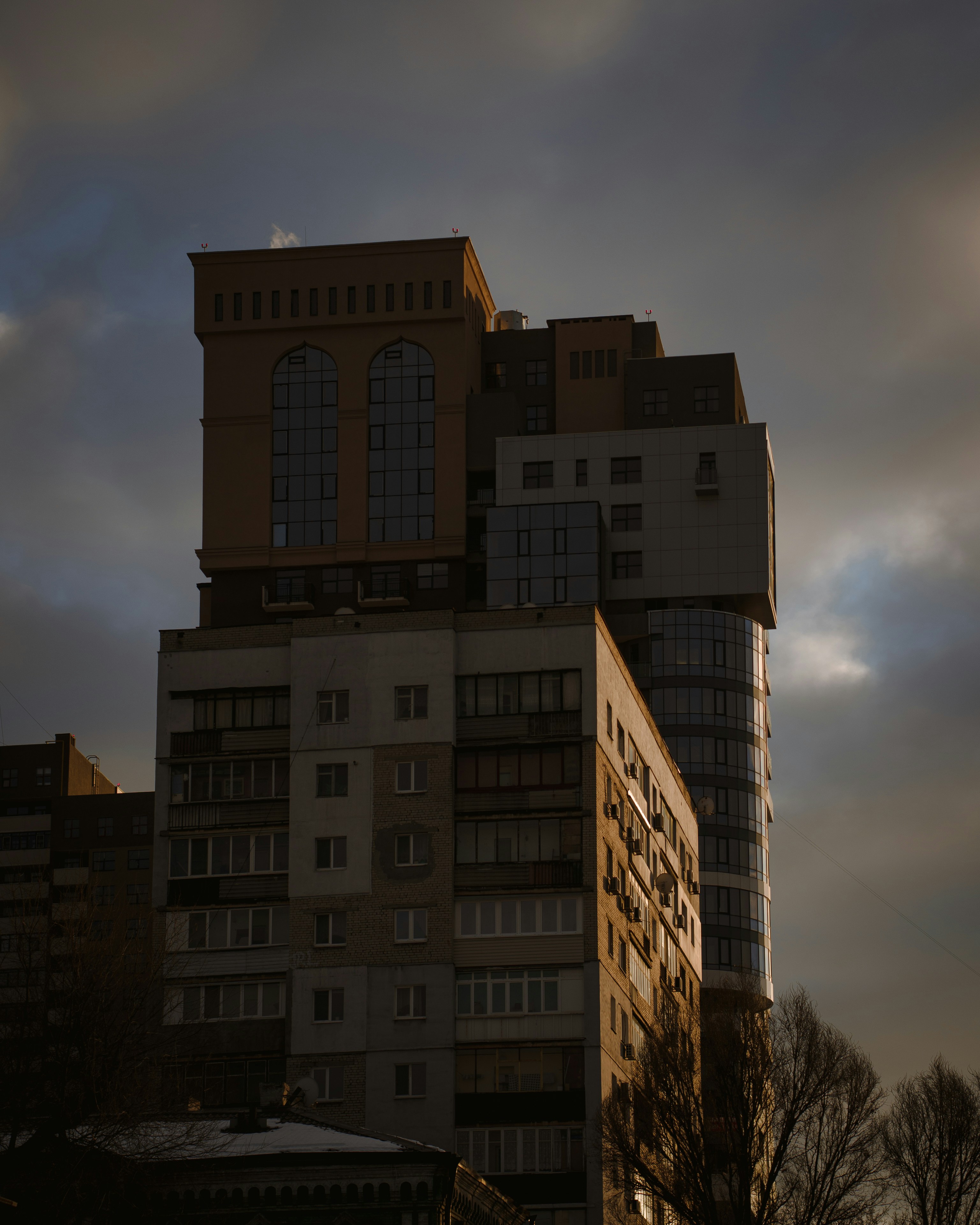 Crowning Sunset on a Layered City Tower