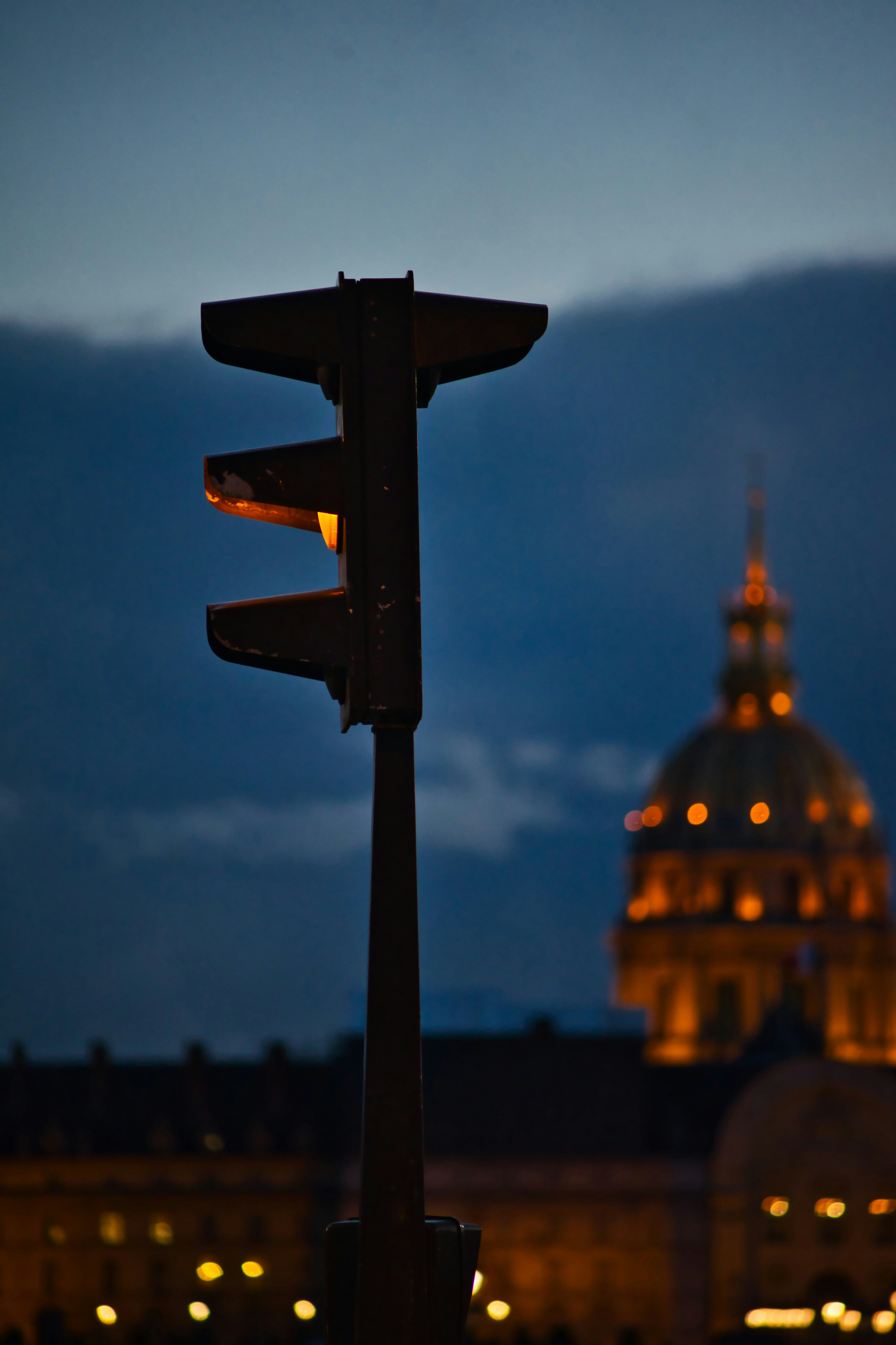 Golden Glow Behind the Urban Signal