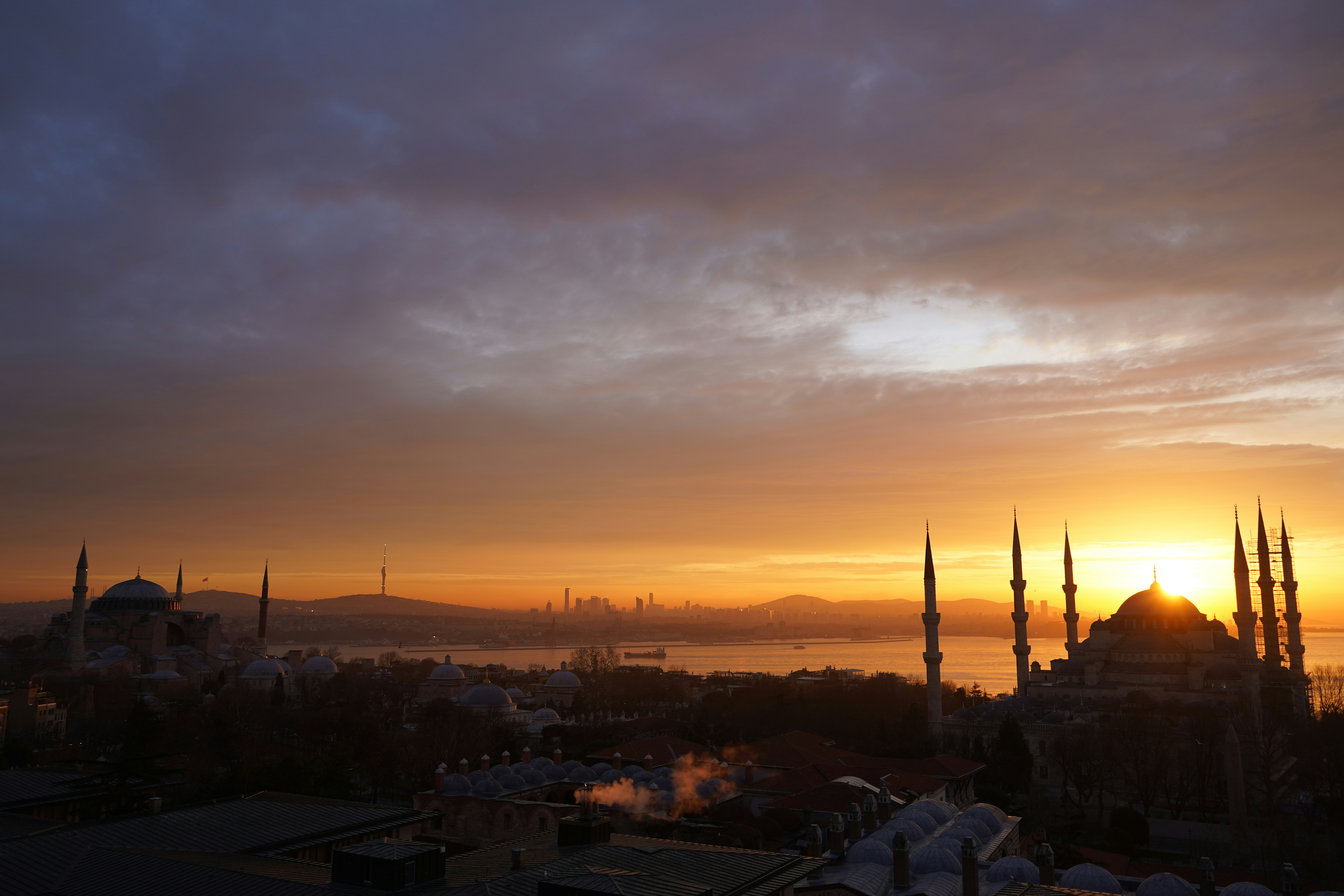 The sun is setting over the city of turkey photo – Free İstanbul Image ...