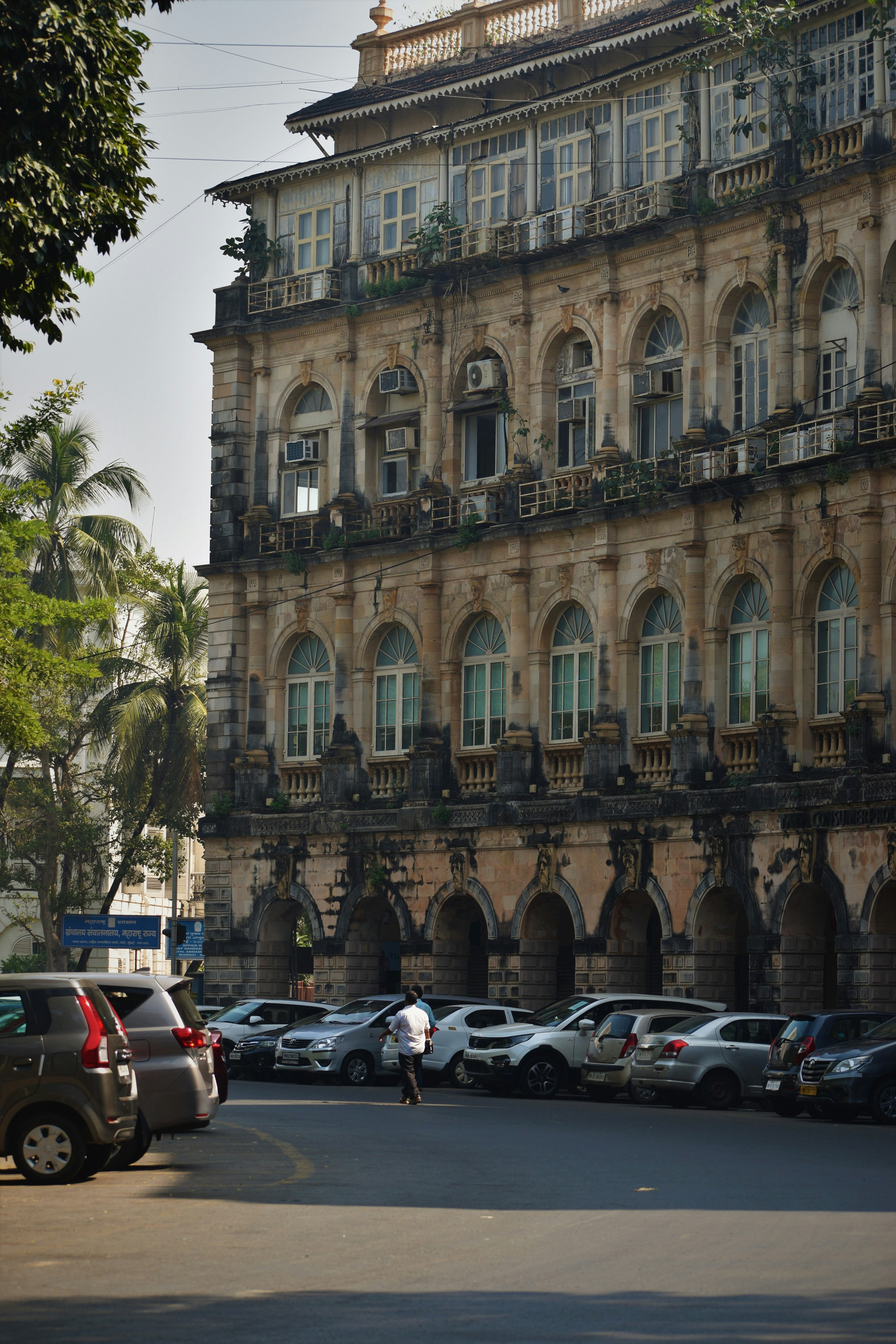 A large building with many windows and balconies photo – Free Mumbai ...