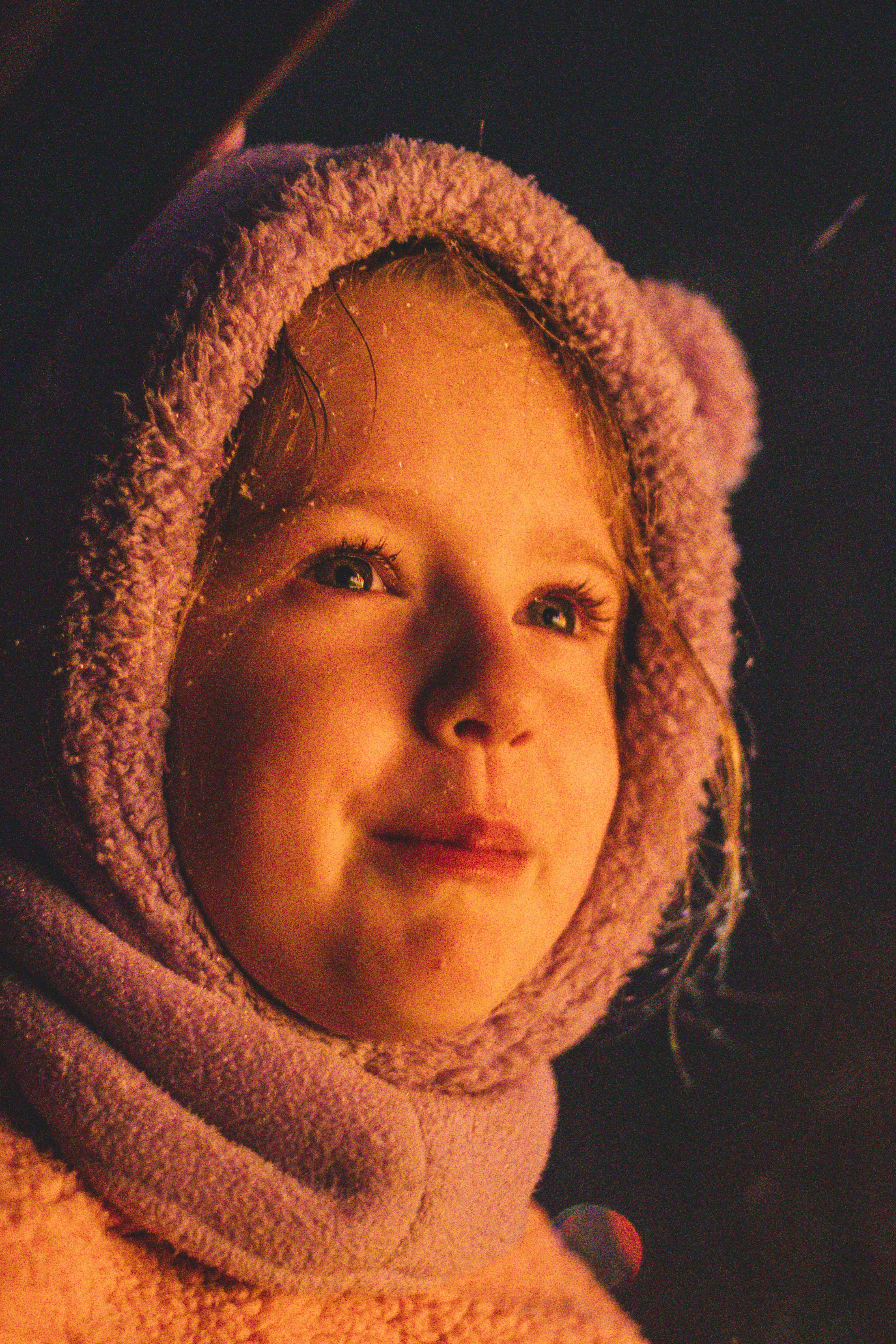 Warm Gaze Under a Cozy Hood