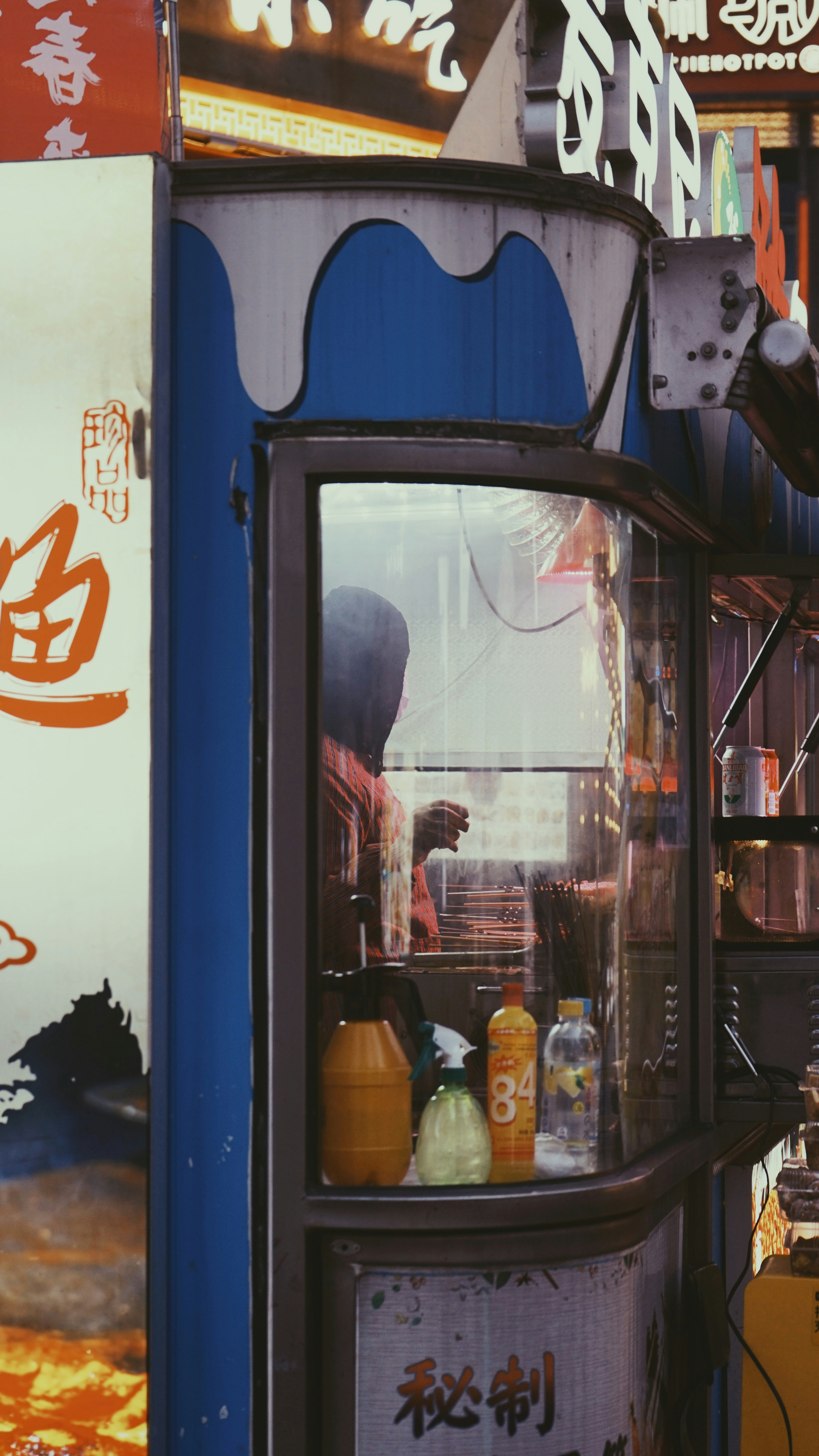 A vending machine sitting on the side of a street photo – Free Grey ...