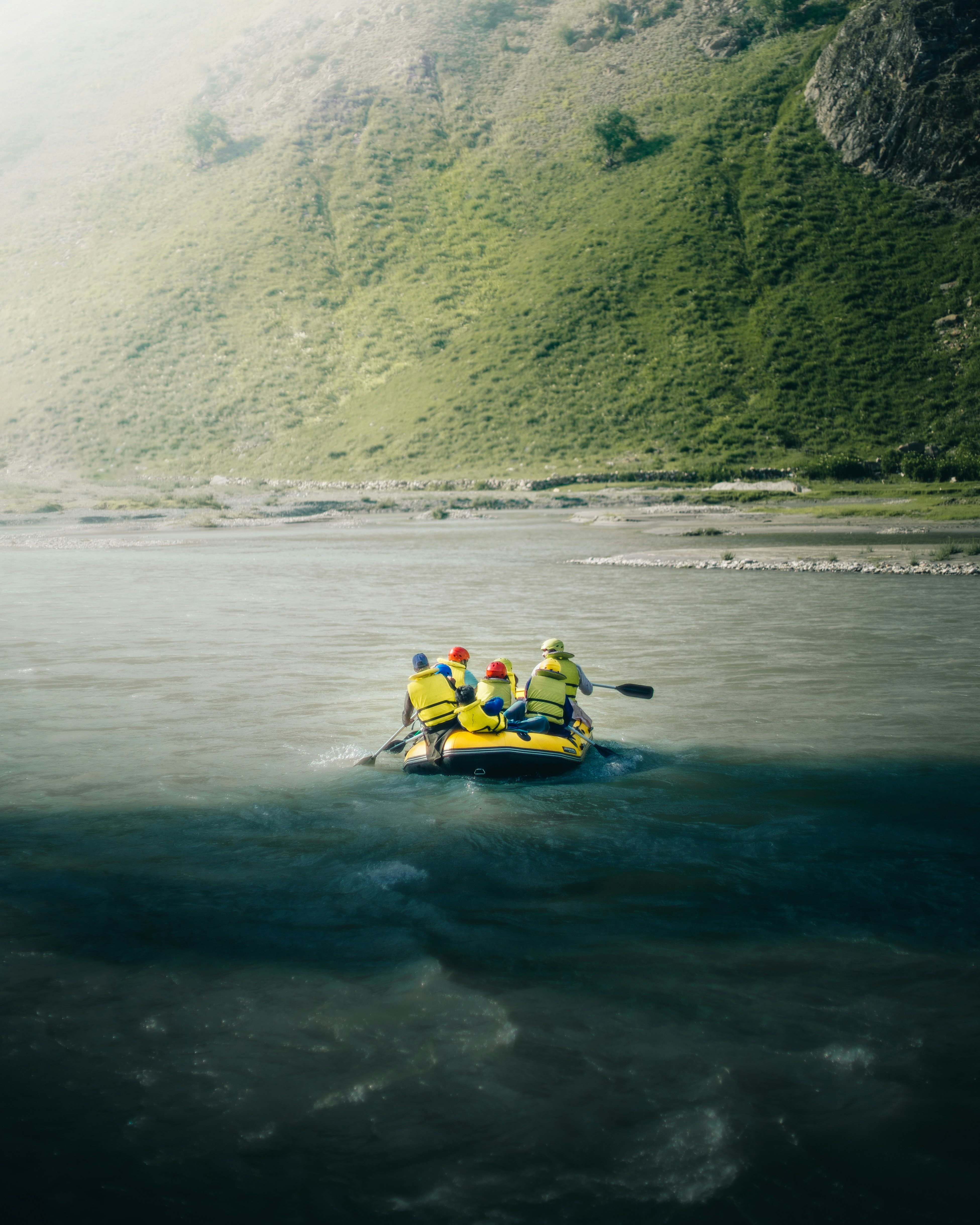 Rugged River Rescue: Yellow Lifeboat Cuts Through Quiet Currents