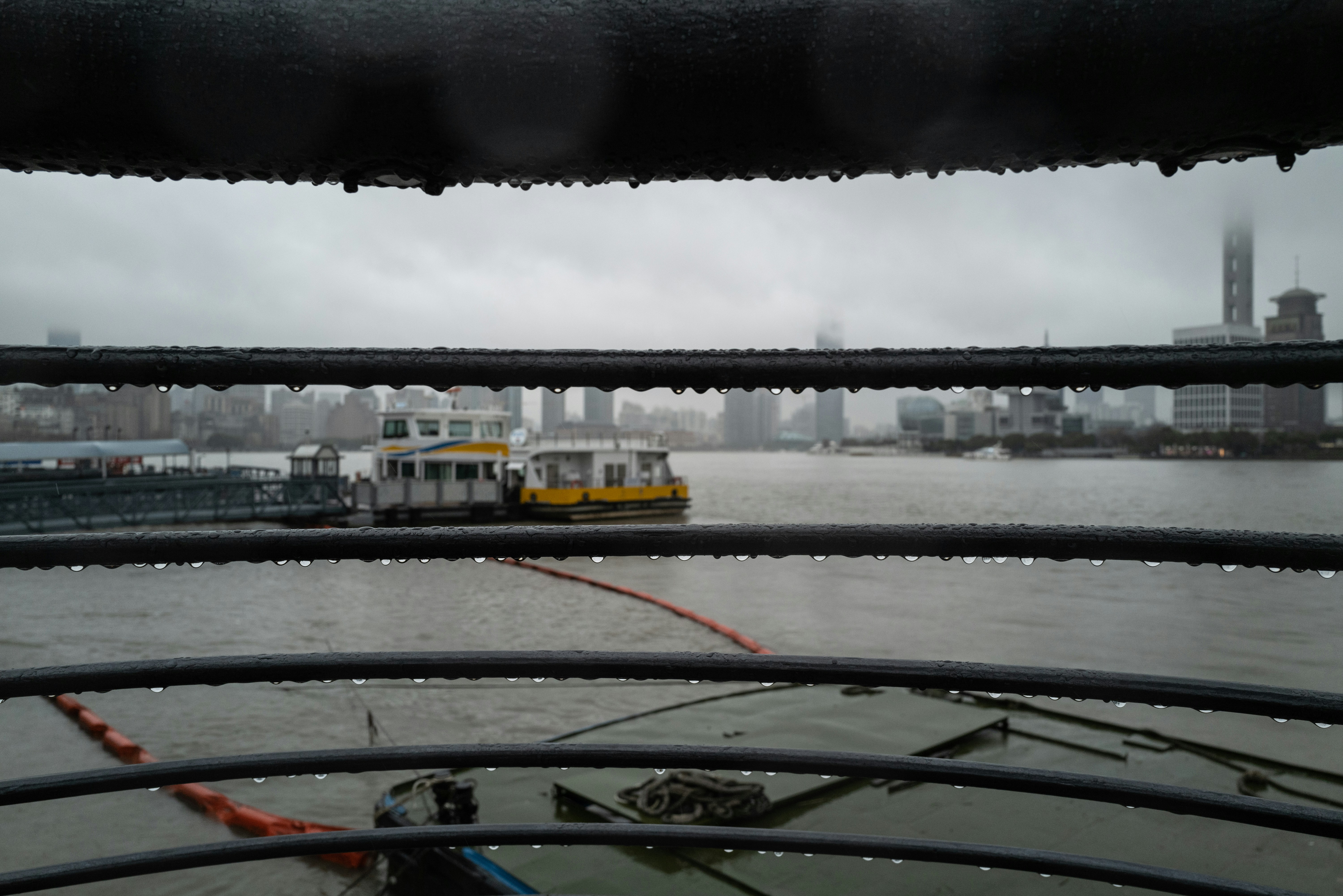Yellow Ferry Through Rain-Softened Harborscape