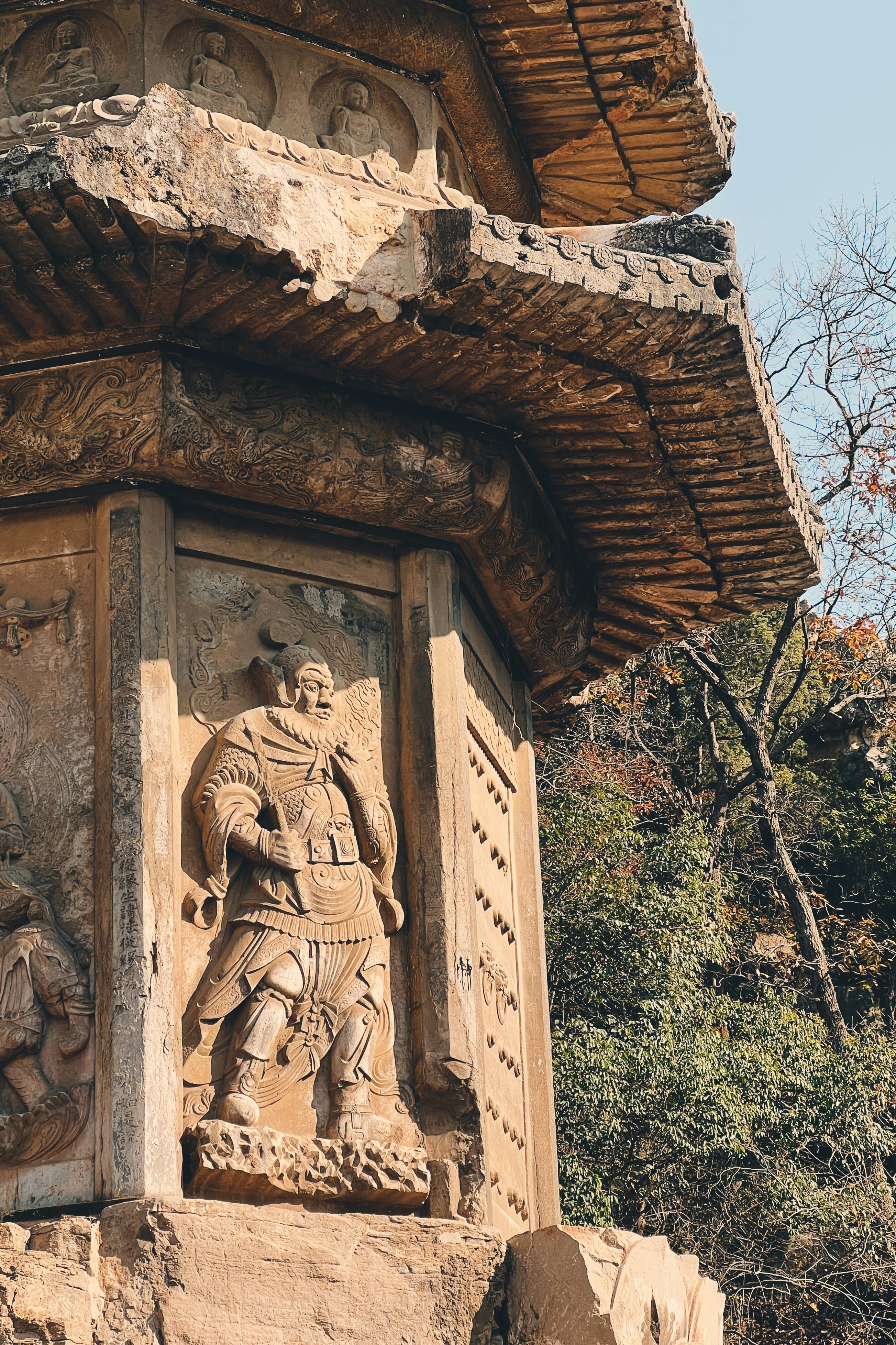 a statue of a man holding a sword
