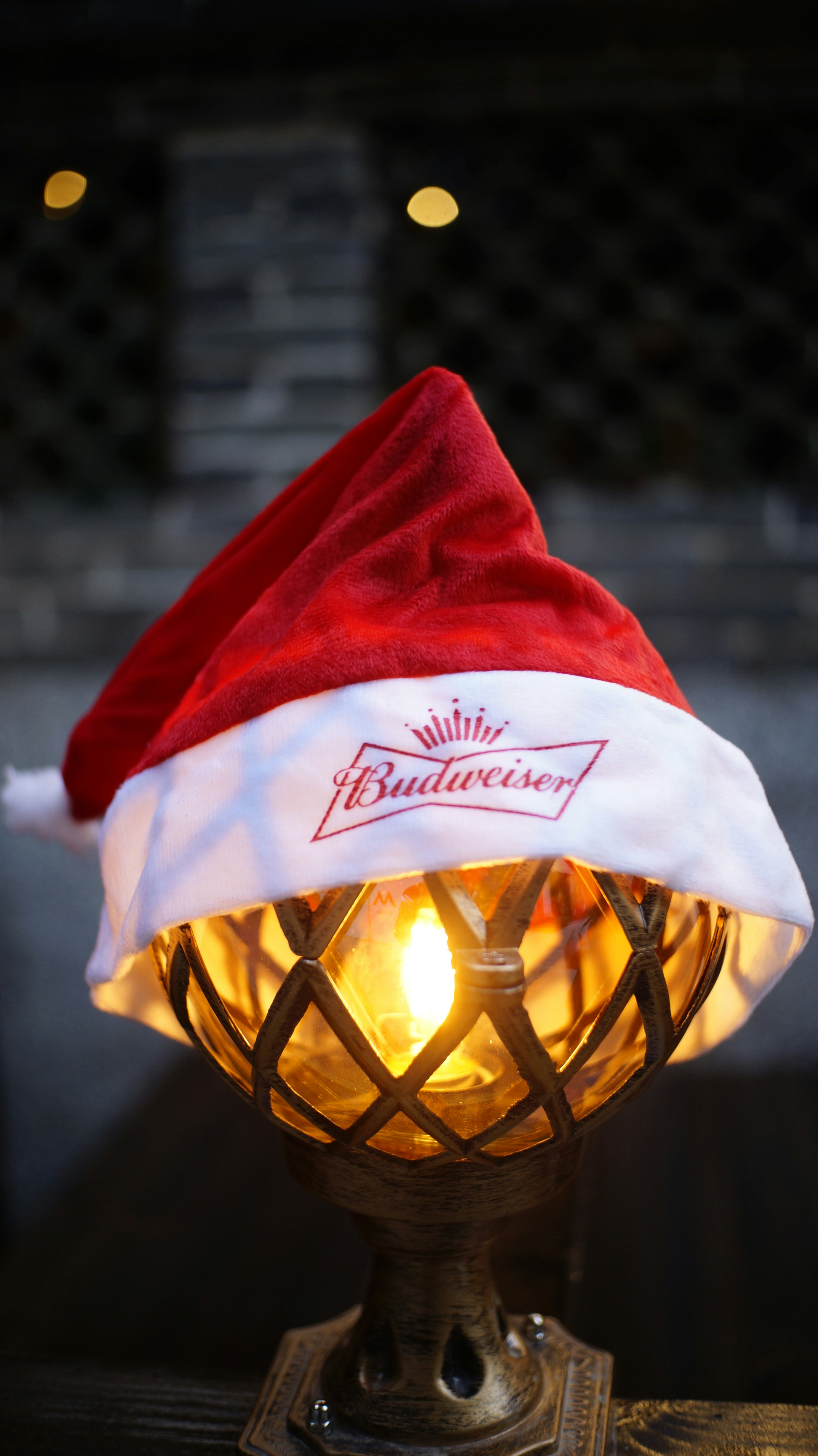 Budweiser Santa Lamp: An Amber Glow Beneath a Festive Red Hat
