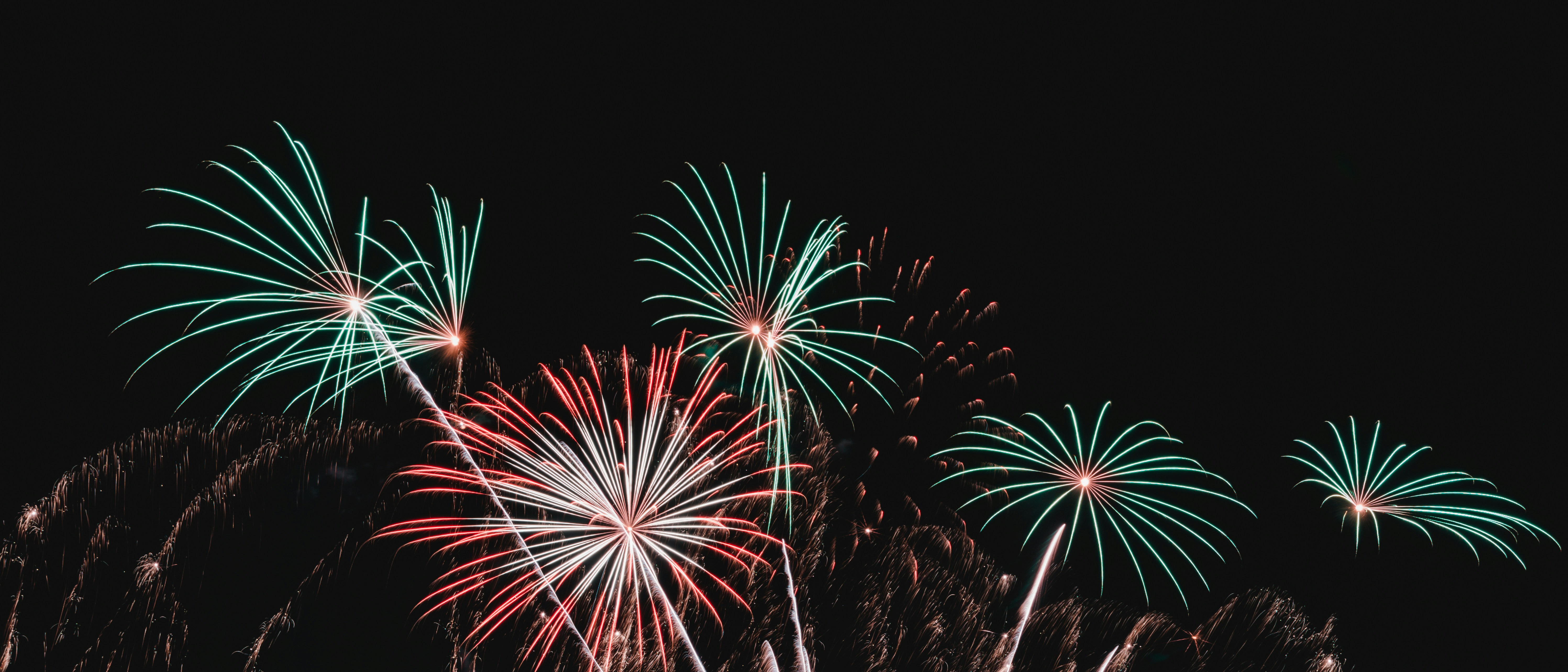 real colorful fireworks in the night sky, colorful fireworks on black background