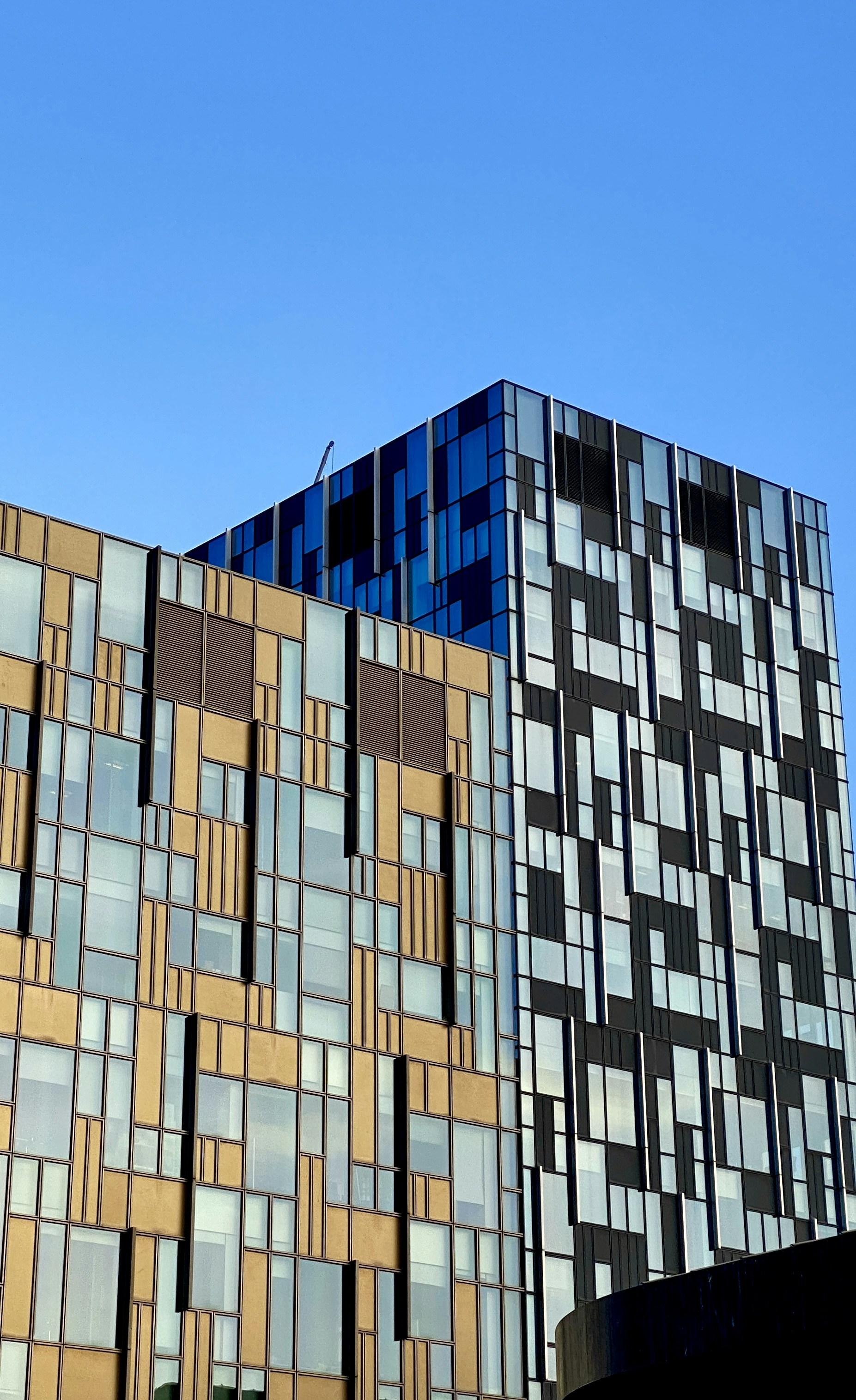 Patchwork Glass: A Prism-Patterned Facade Reaching for the Sky