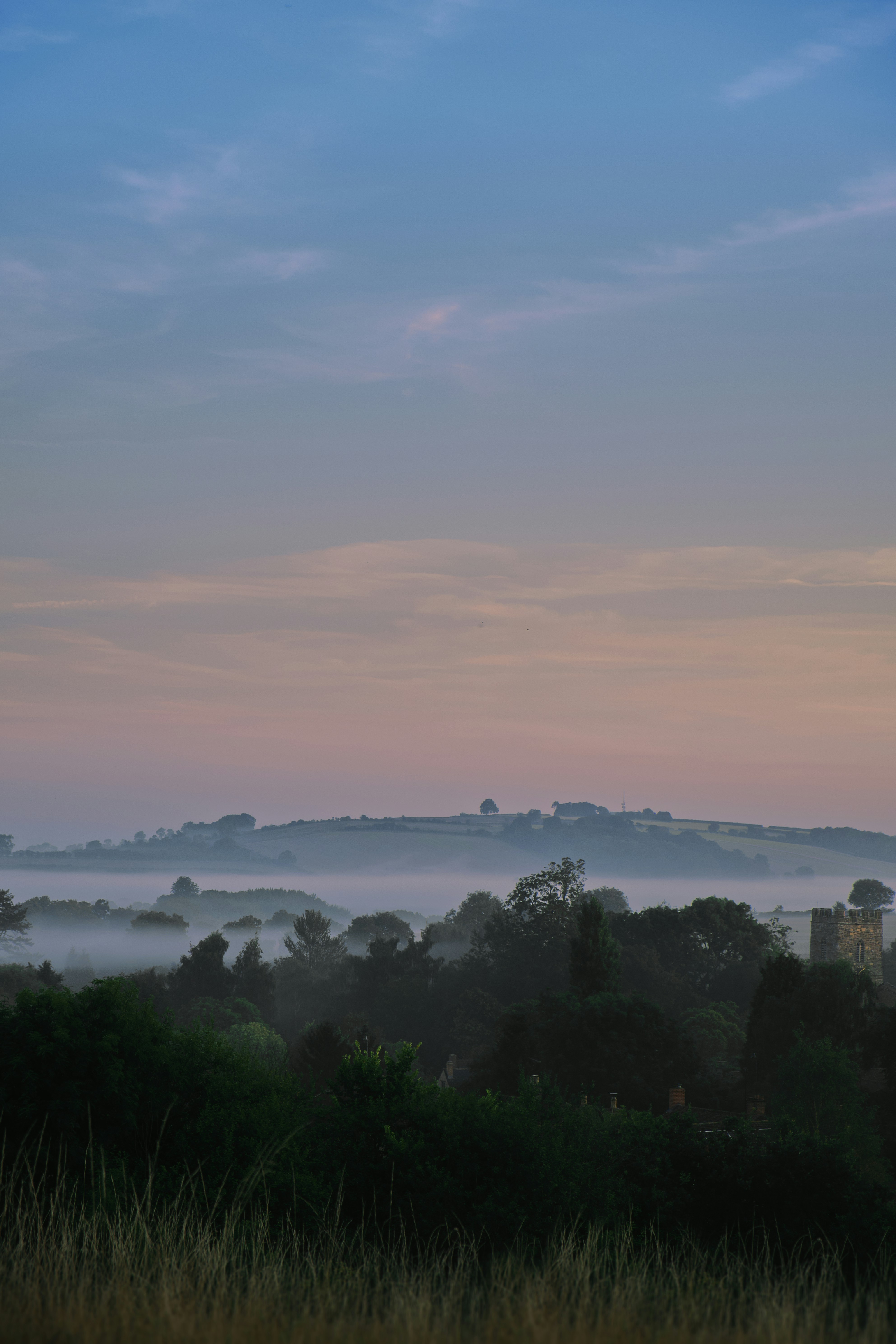 Dawn Veil Over the Valley Ridge