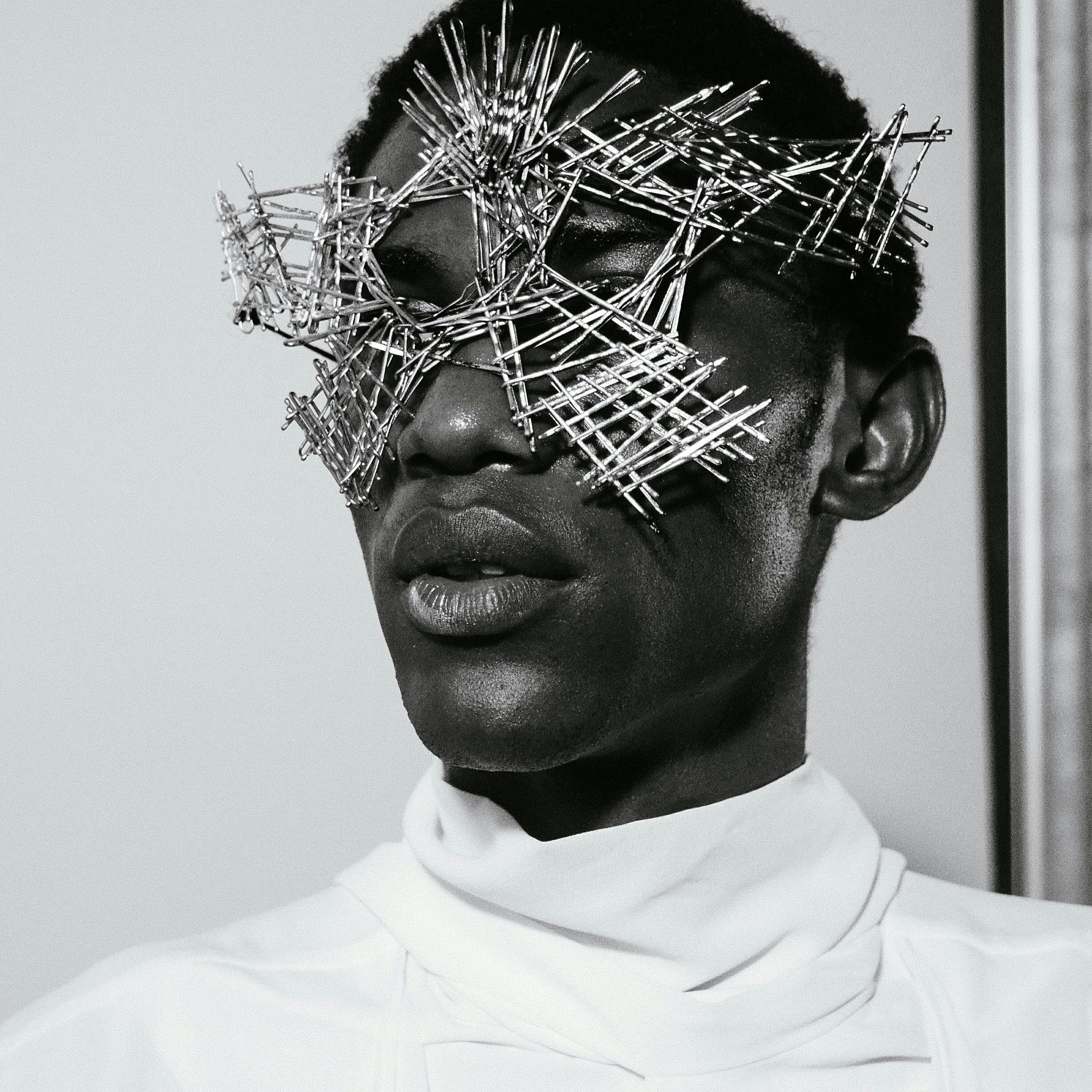 A man with a bunch of pins on his face photo – Free Human Image on Unsplash