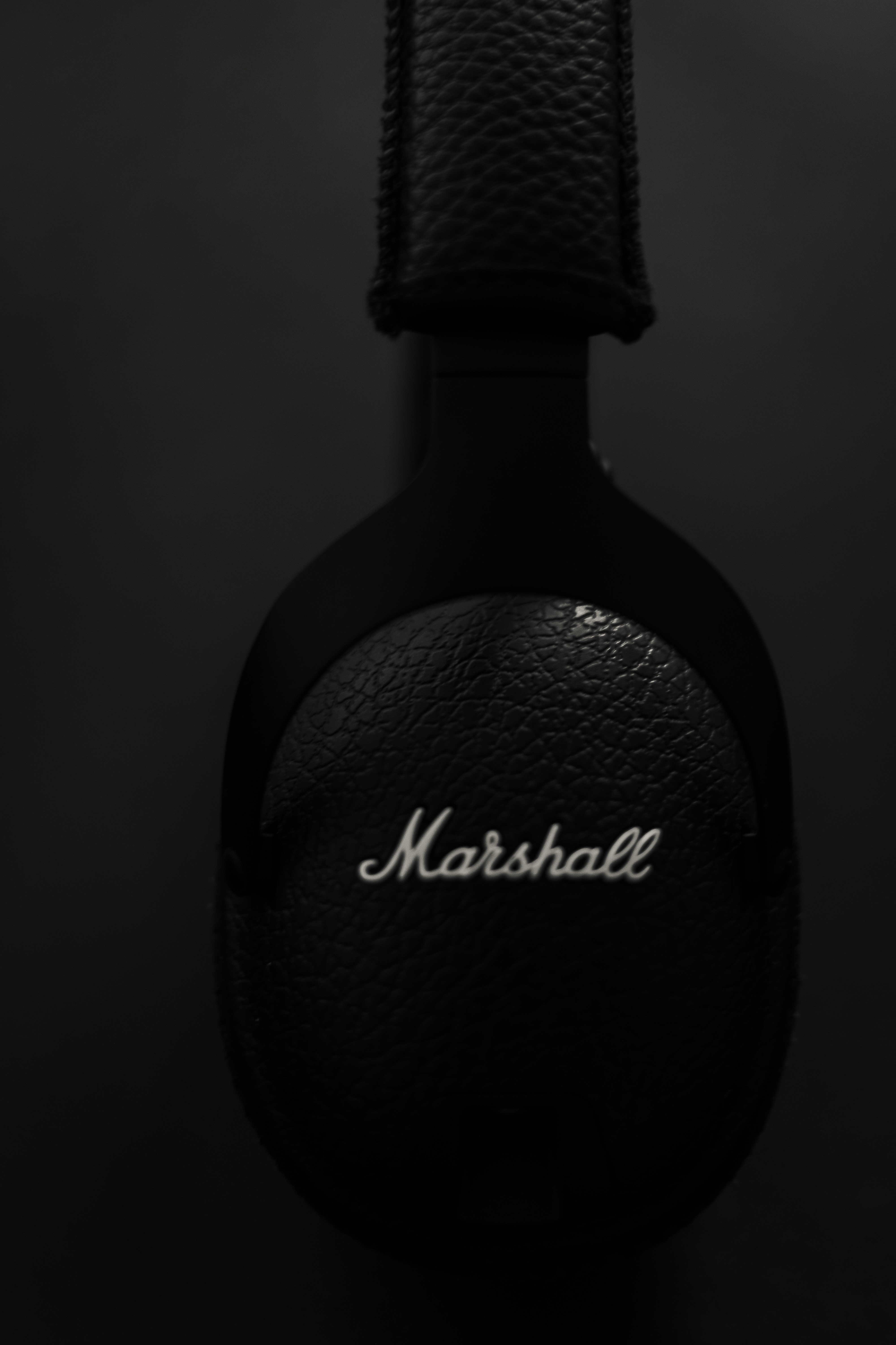 A pair of headphones with the word marshall written on it photo – Free ...