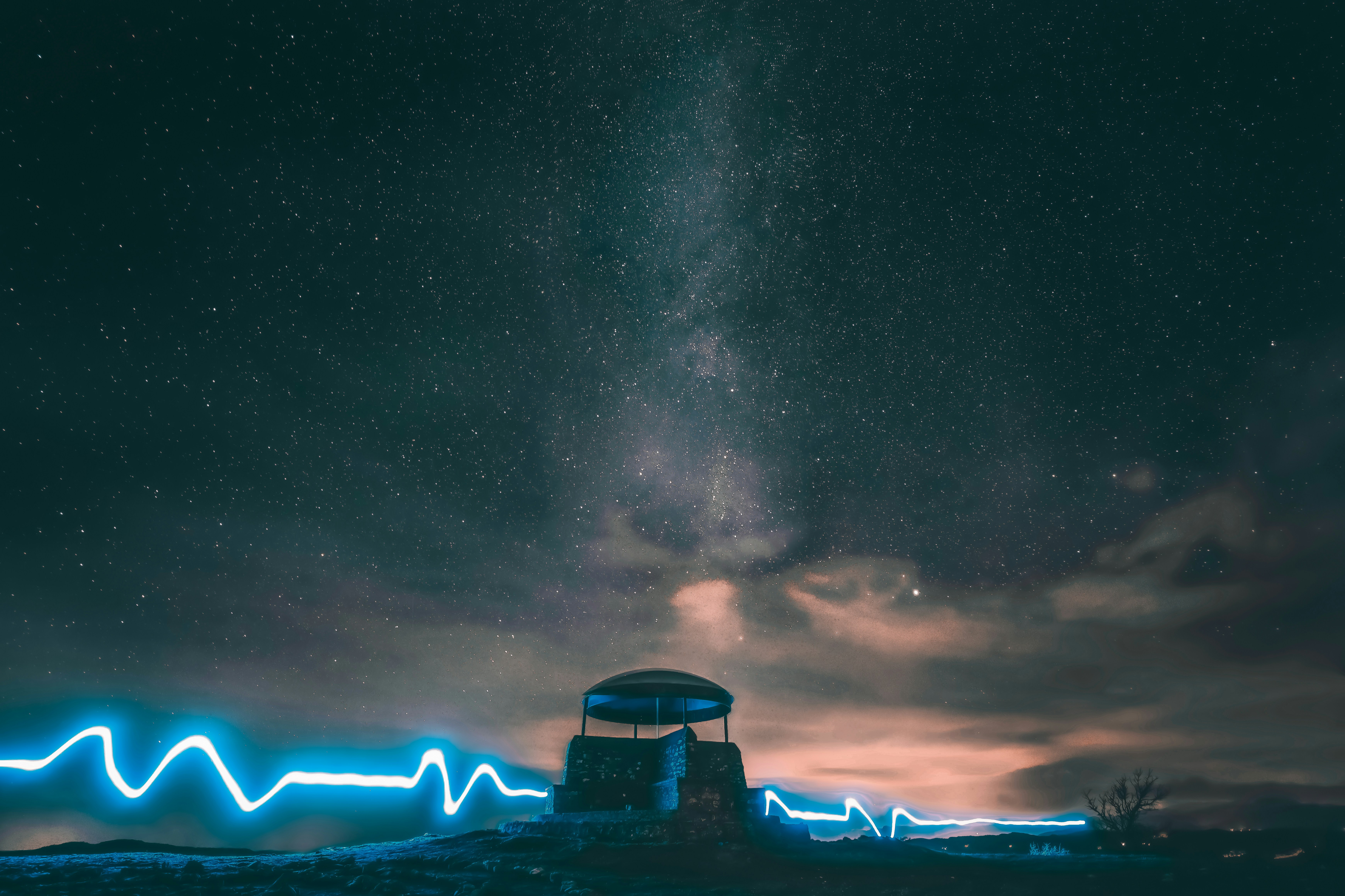 Milky Way over a Boundary: Light Trails Across a Desert Night