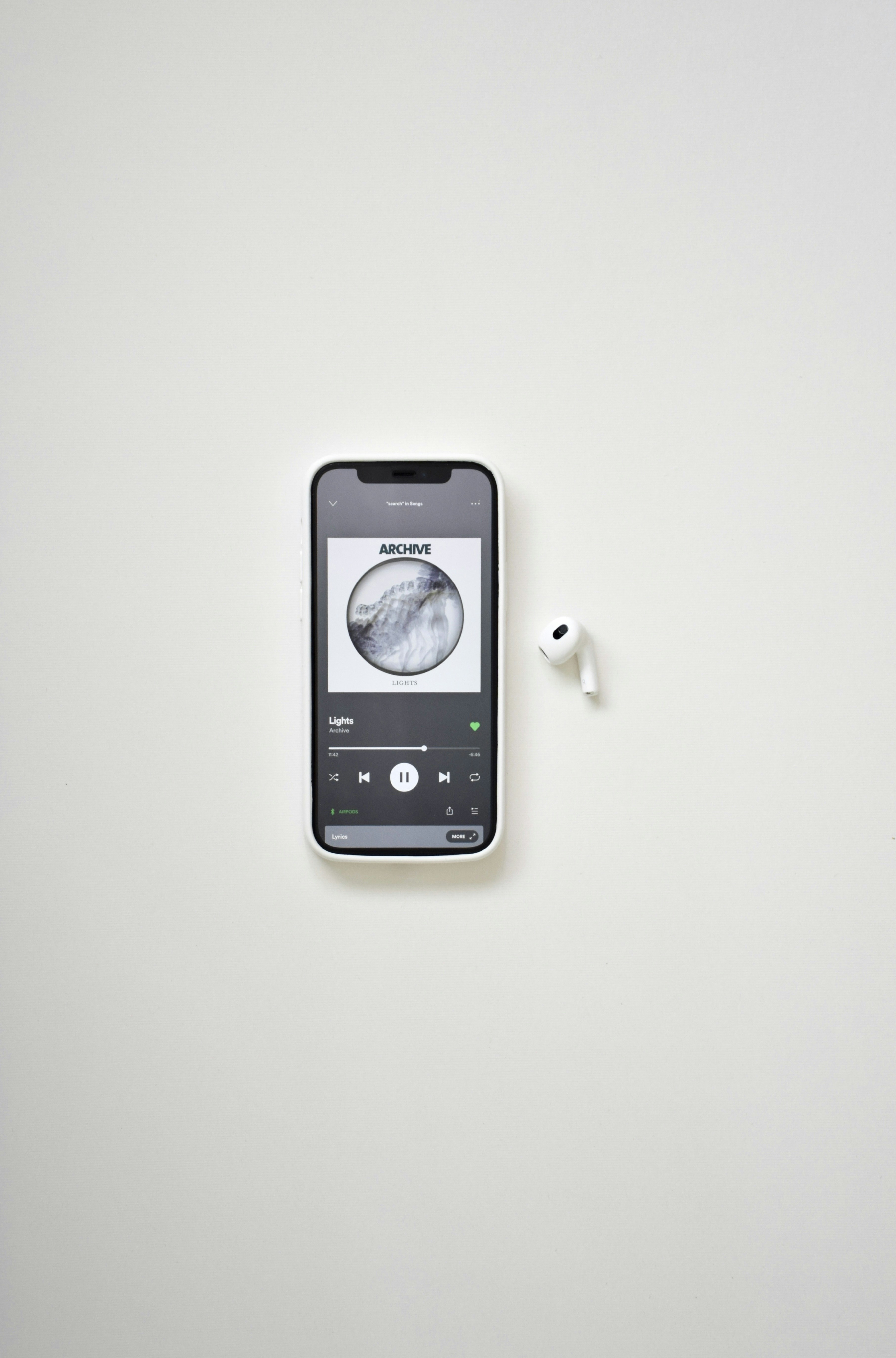 Quiet Interface on a White Stage: Smartphone Display and a Single Earbud