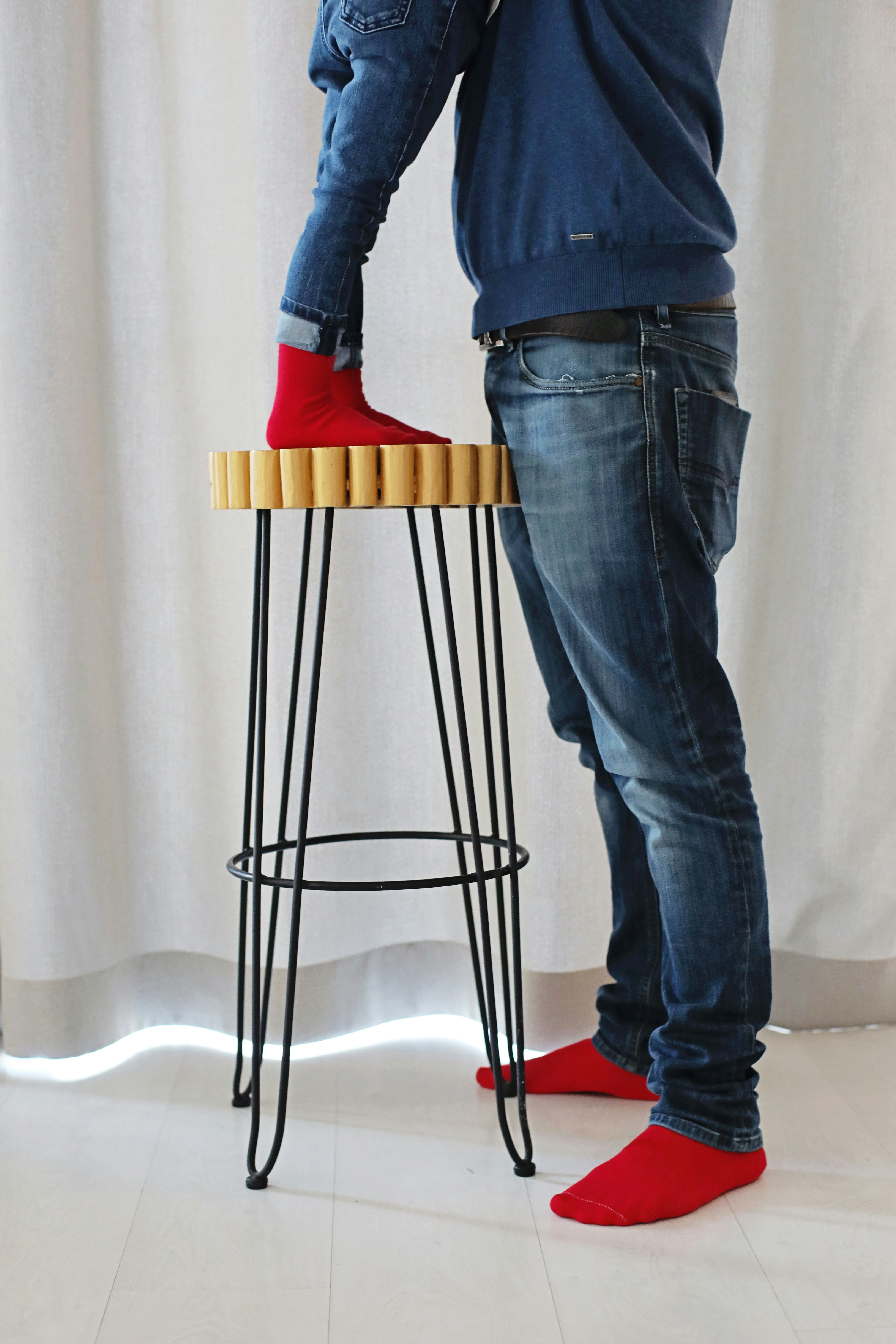 Red-Socked Balance: A Minimal Studio Moment