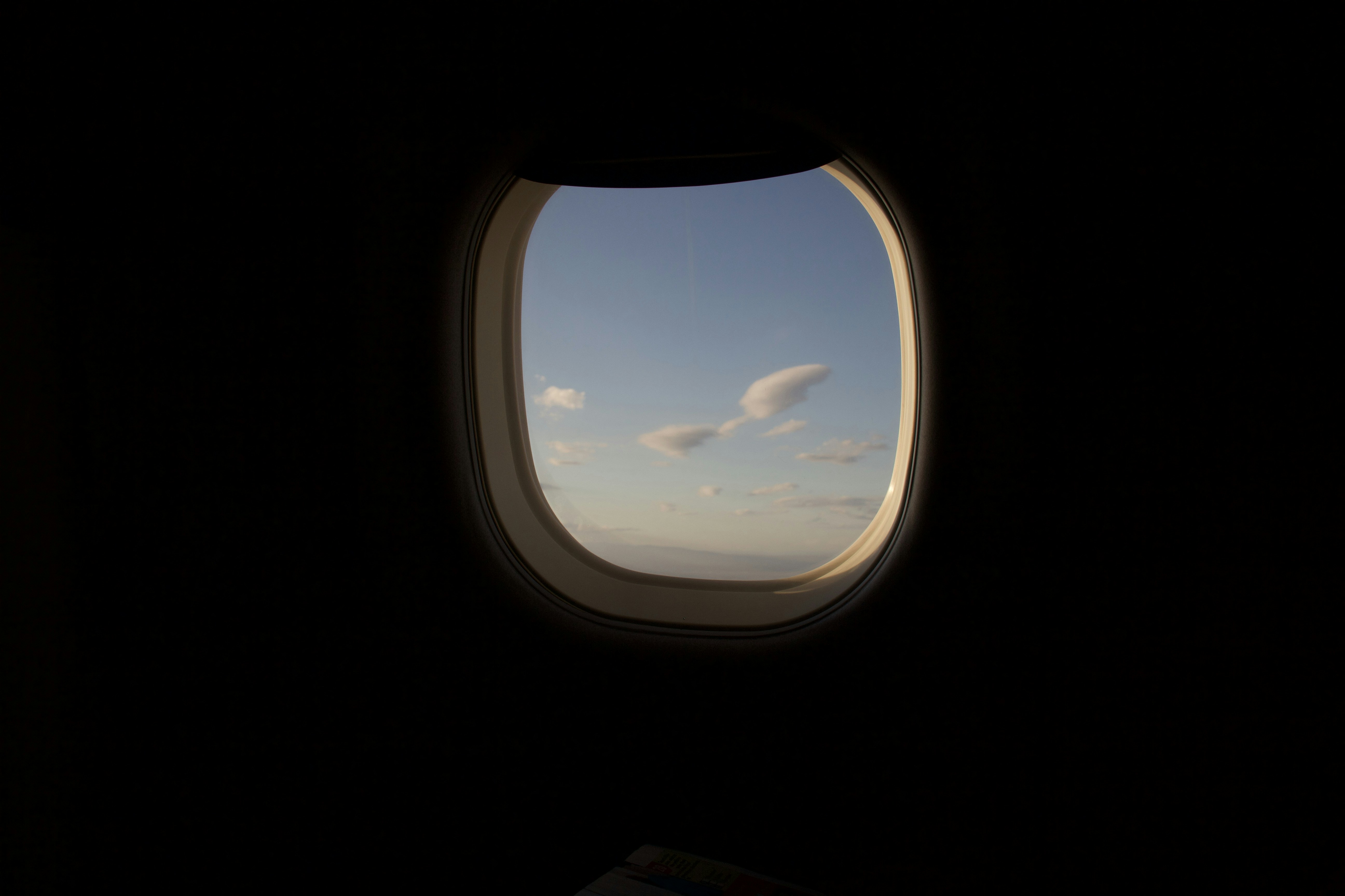 a view of the sky through an airplane window