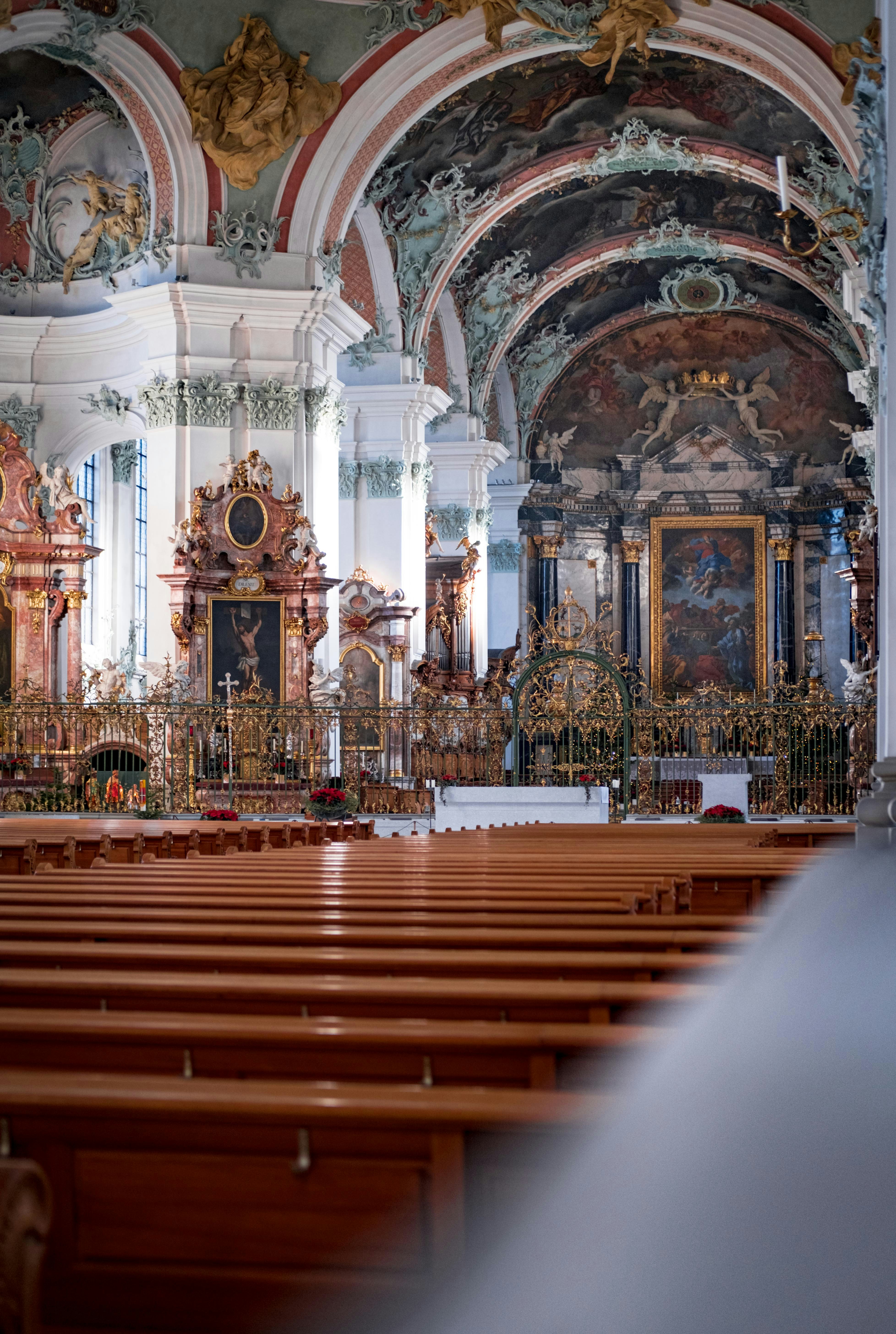 A church filled with lots of wooden pews photo – Free Church Image on ...