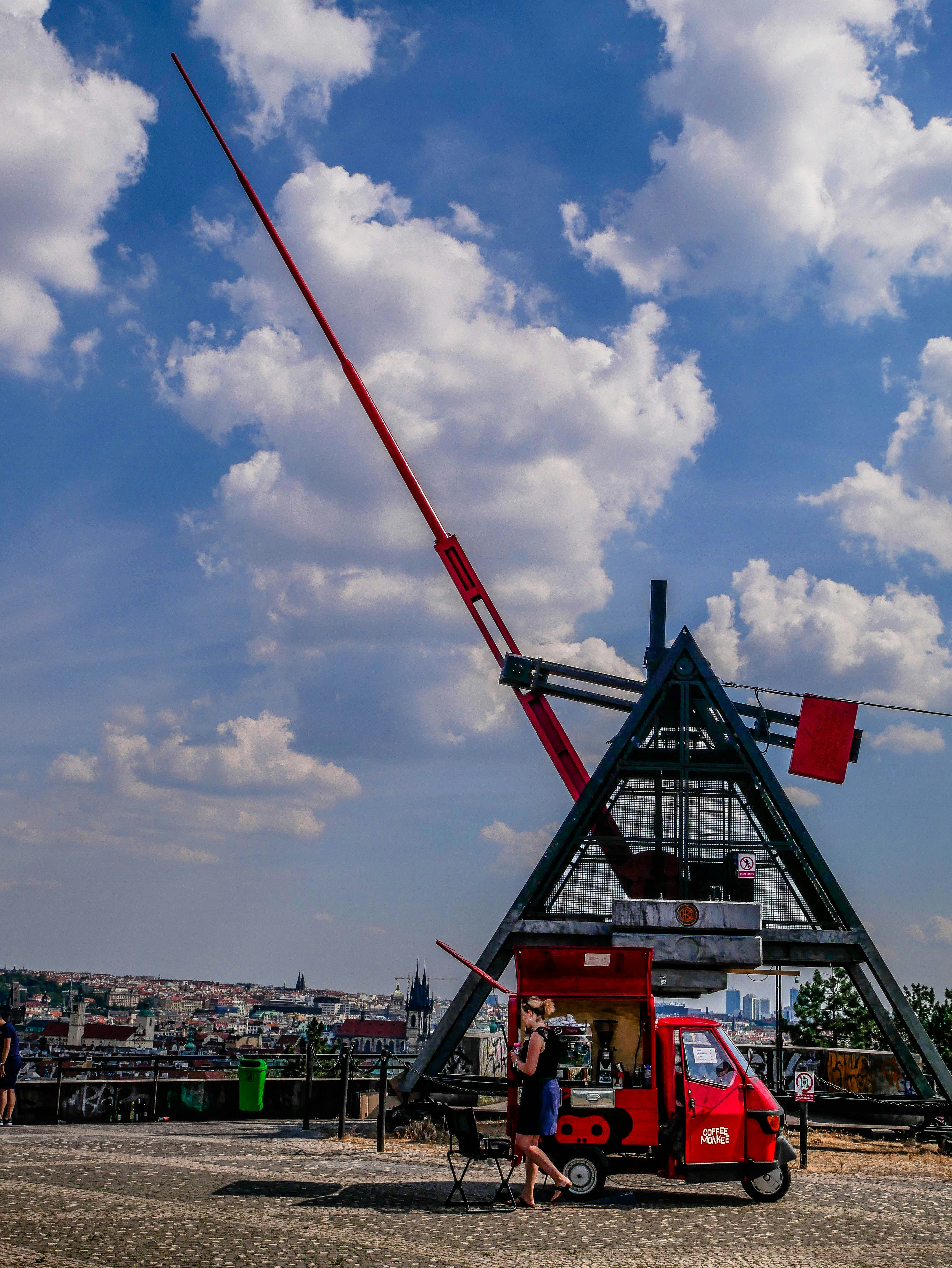 Red Triangle Crane Overlook: A City Framed by Geometric Steel