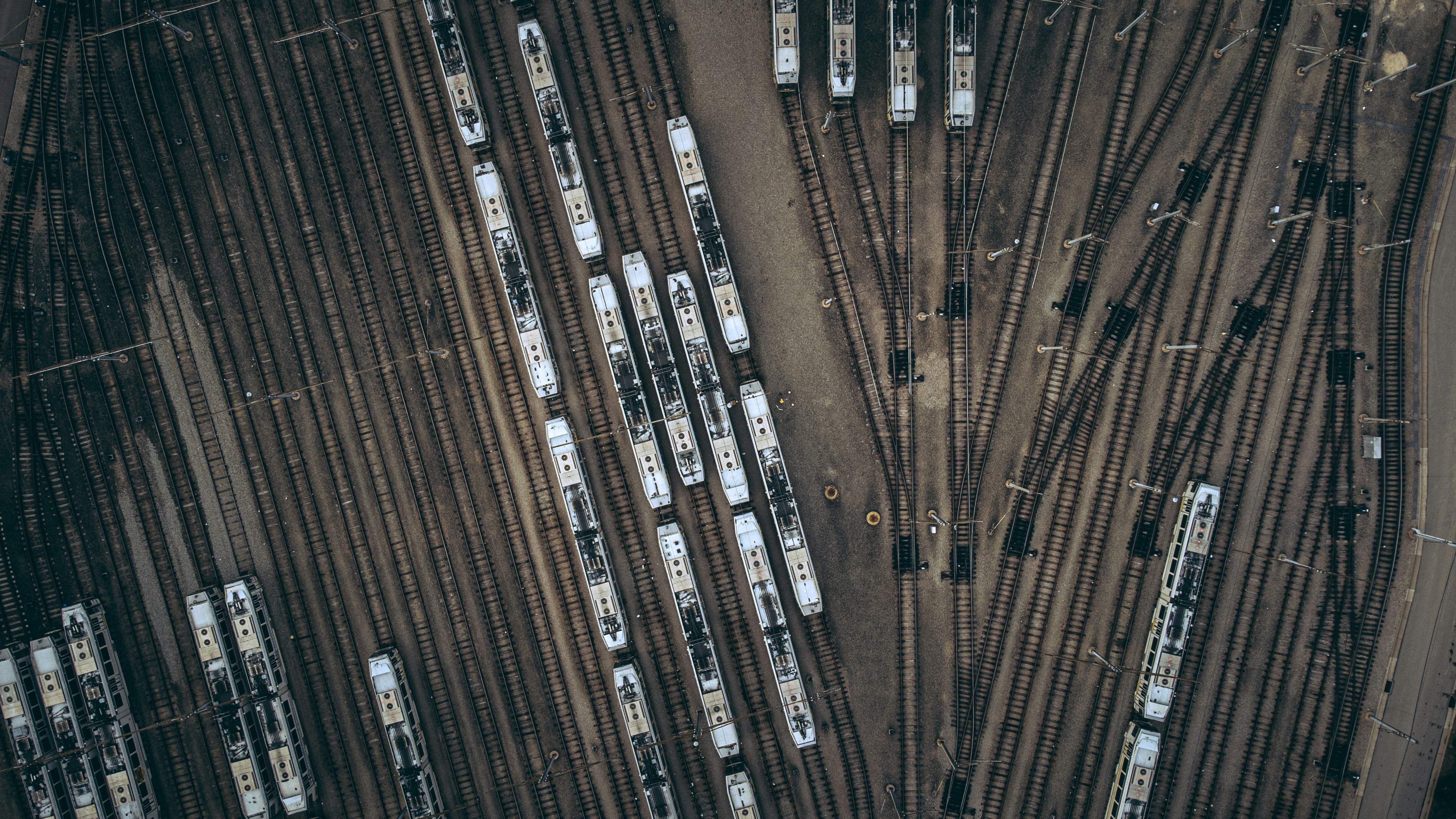 A train yard filled with lots of train cars photo – Free Pa Image on ...