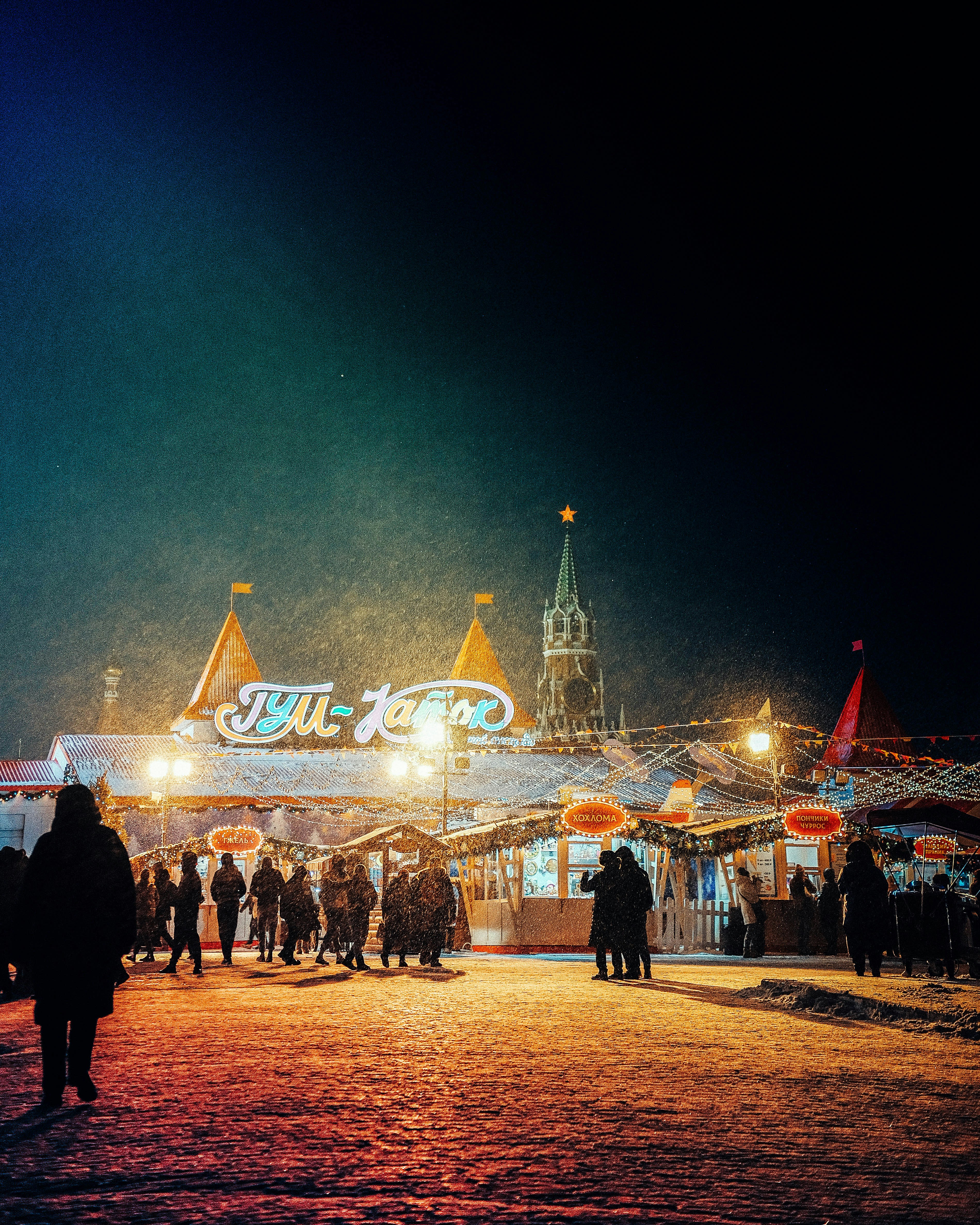 Neon Snow Market under a Star-Topped Spire