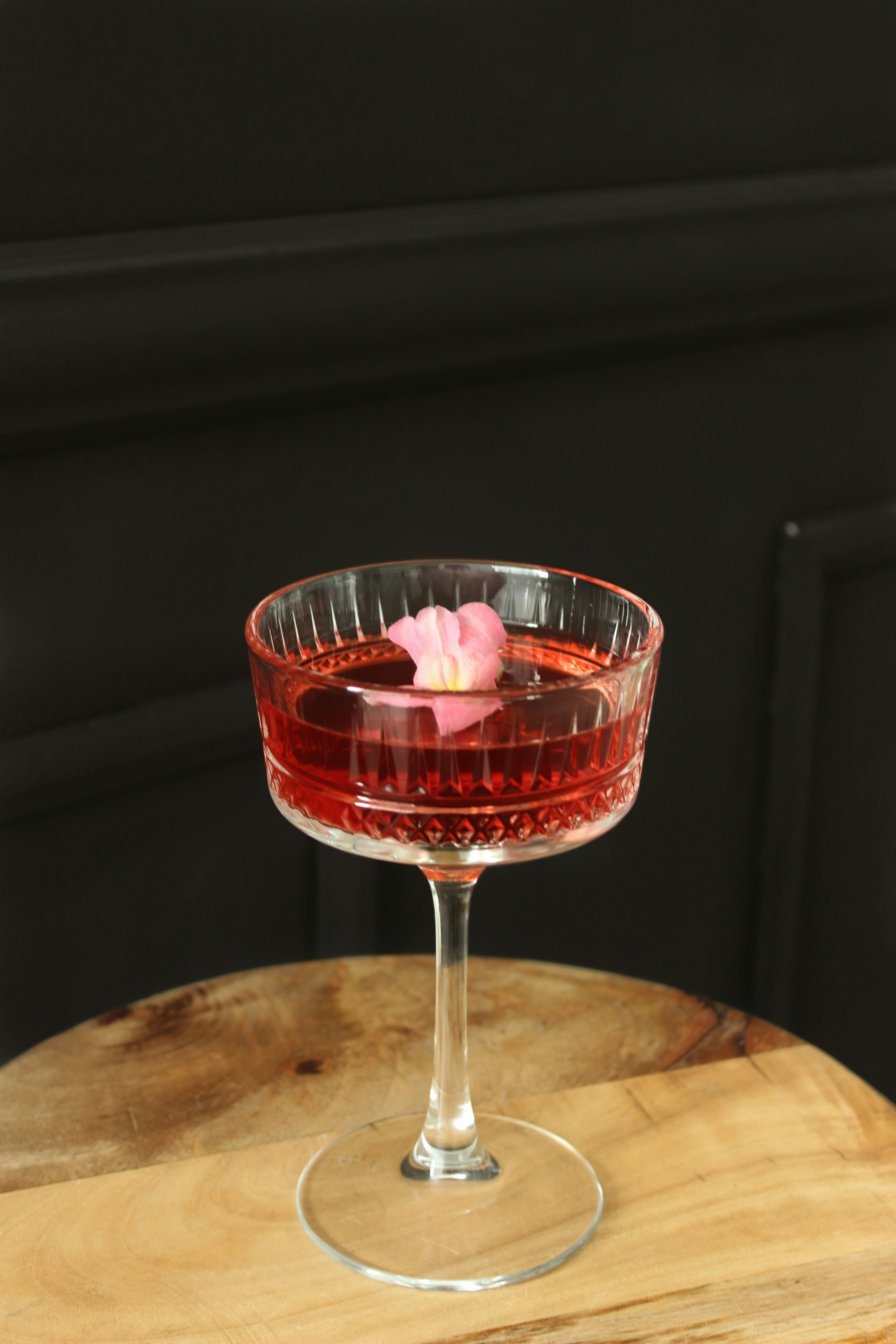 Crimson Cocktail on Bright Wood