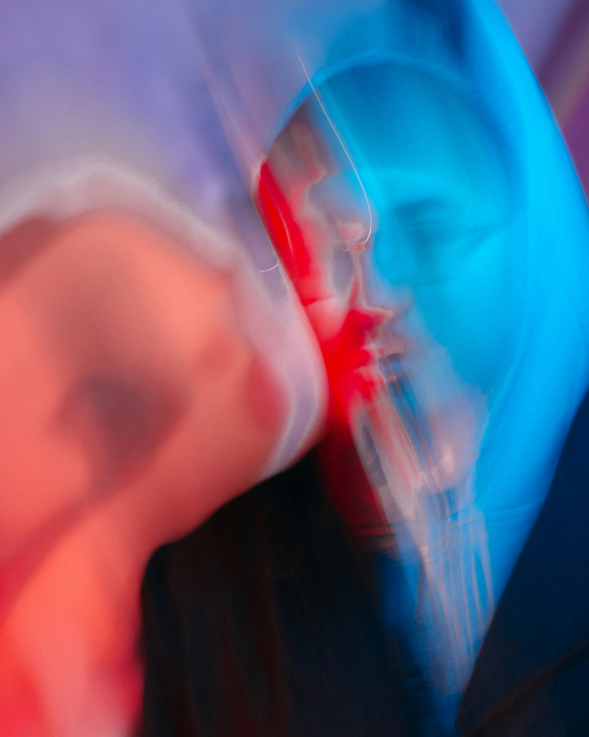 Chromatic Blur: Neon Red and Blue in Motion