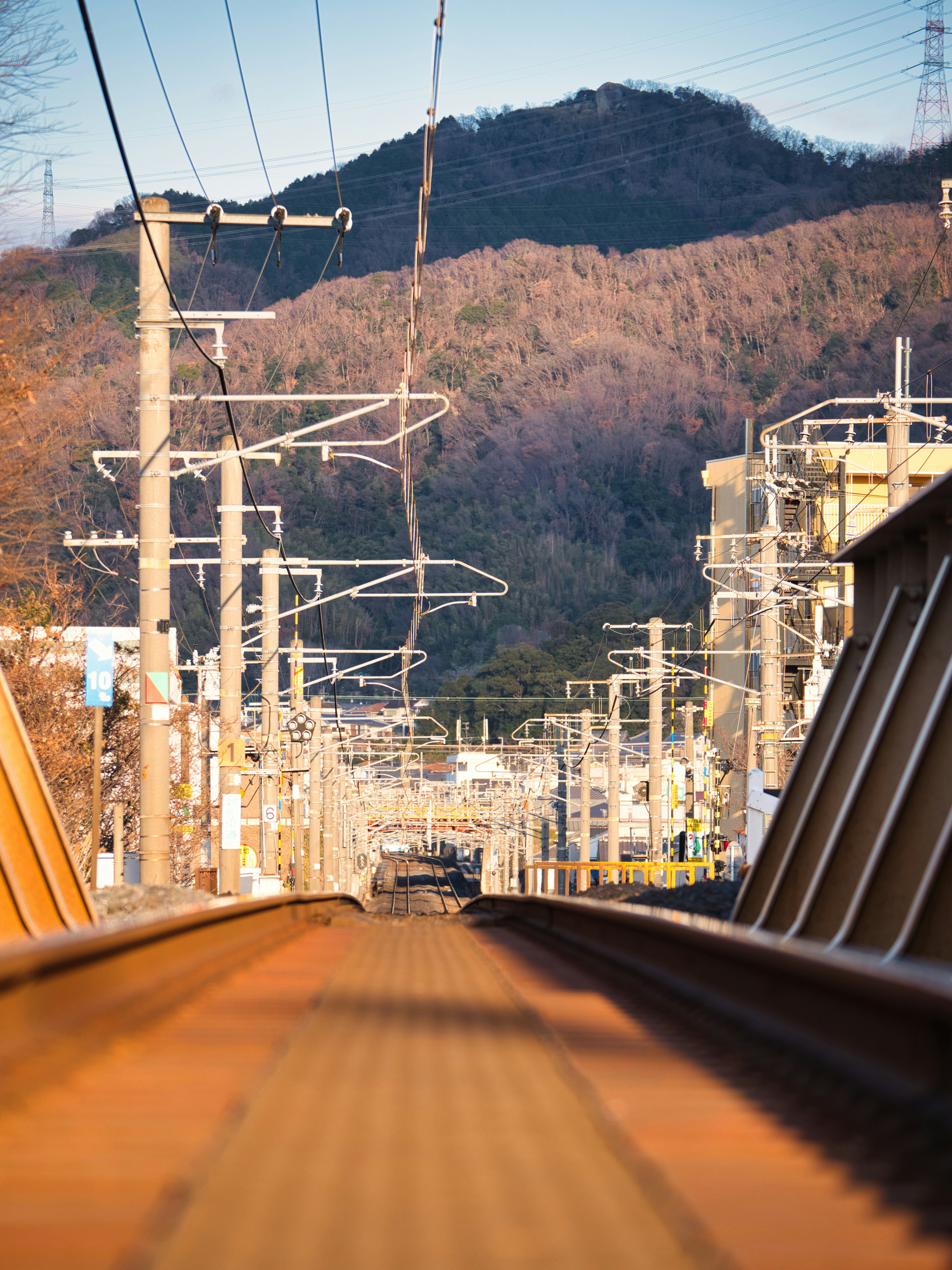 Rails to the Mountain: A Quiet Corridor of Power Lines