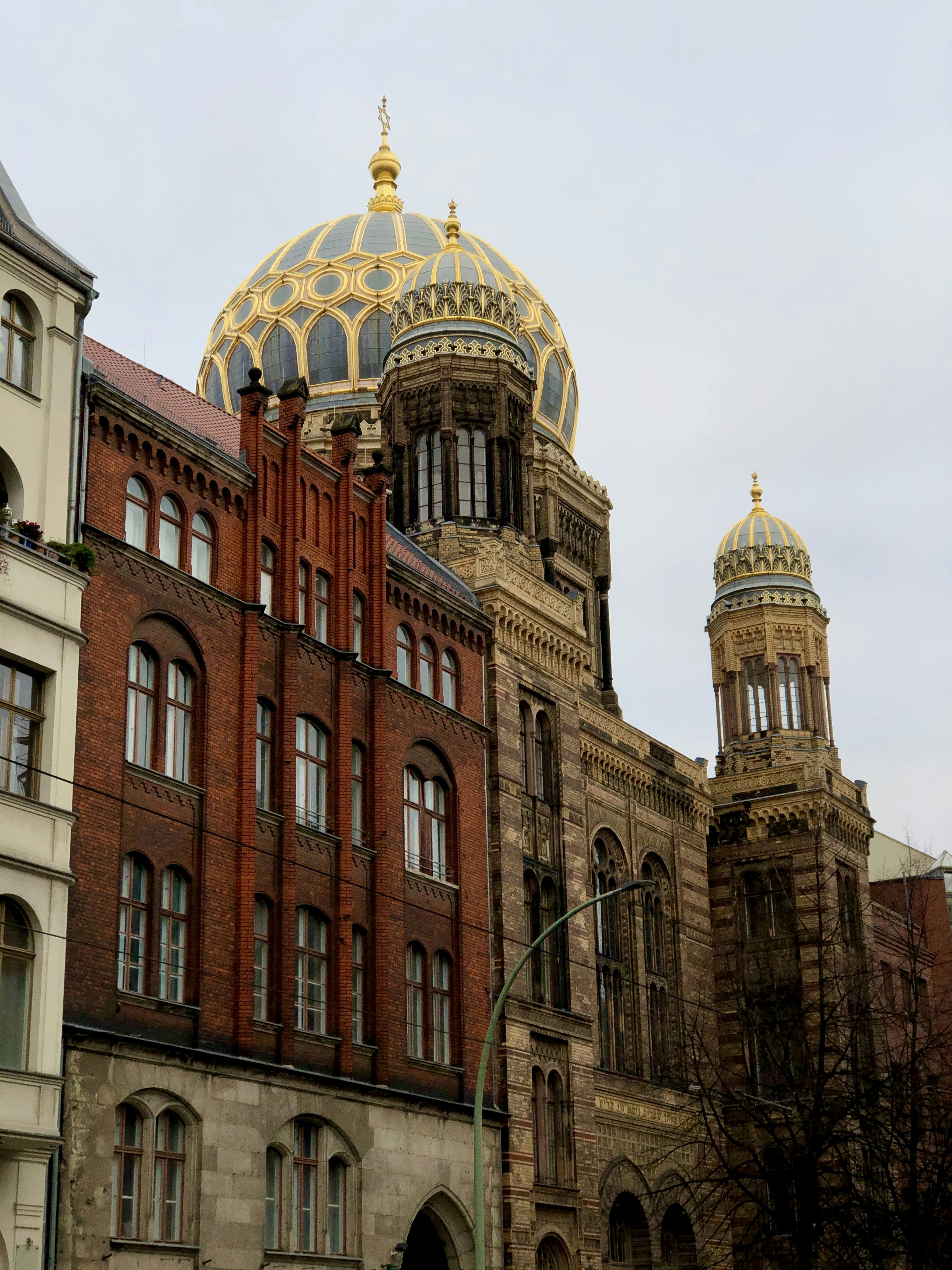 Golden Domes Over a Brick Skyline: A Quiet City Moment