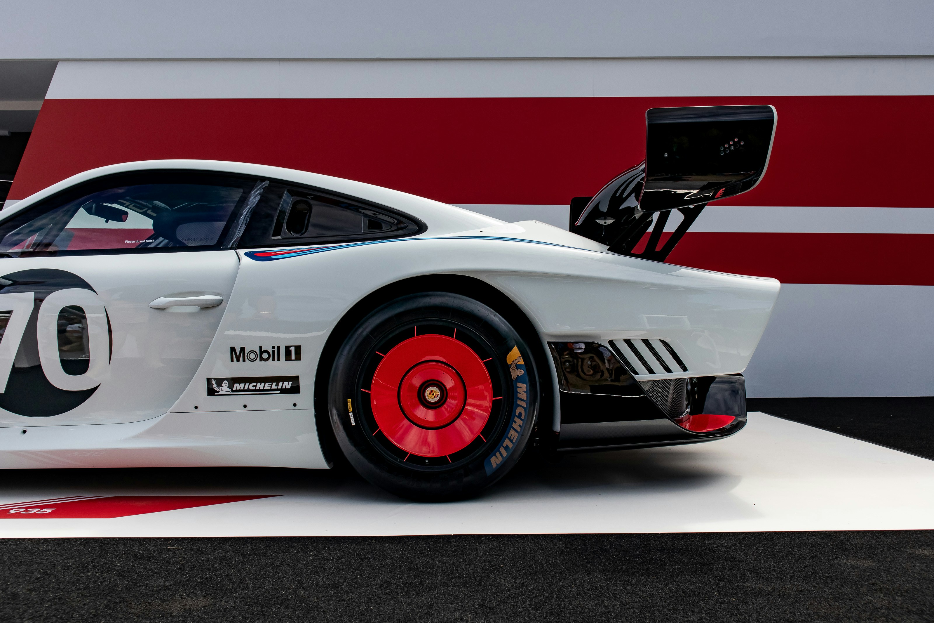 A white sports car with red rims on display photo – Free 935 Image on ...