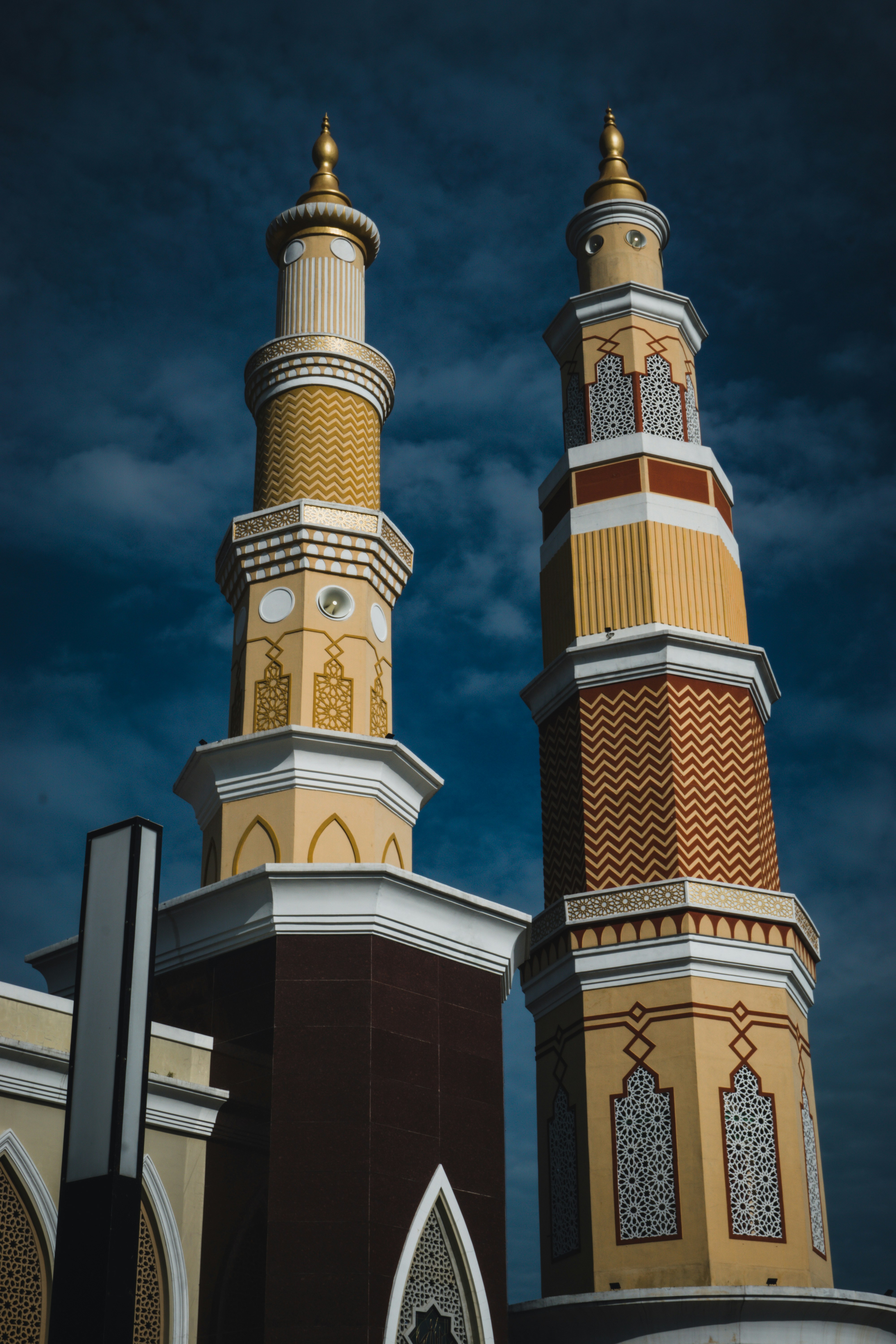 a couple of tall towers sitting next to each other