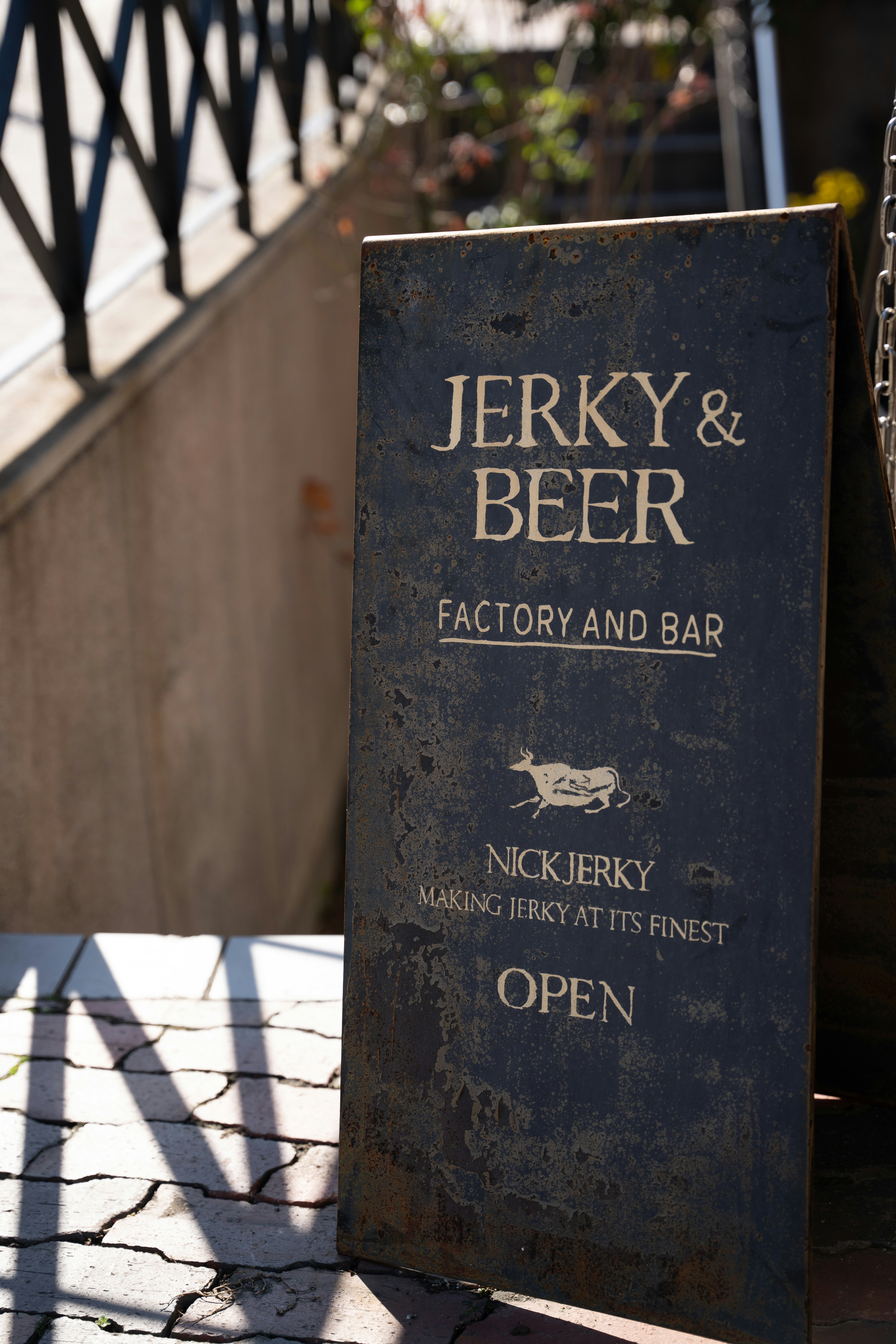 Industrial Signboard of Jerky & Beer: Weathered Sign on the City Walk