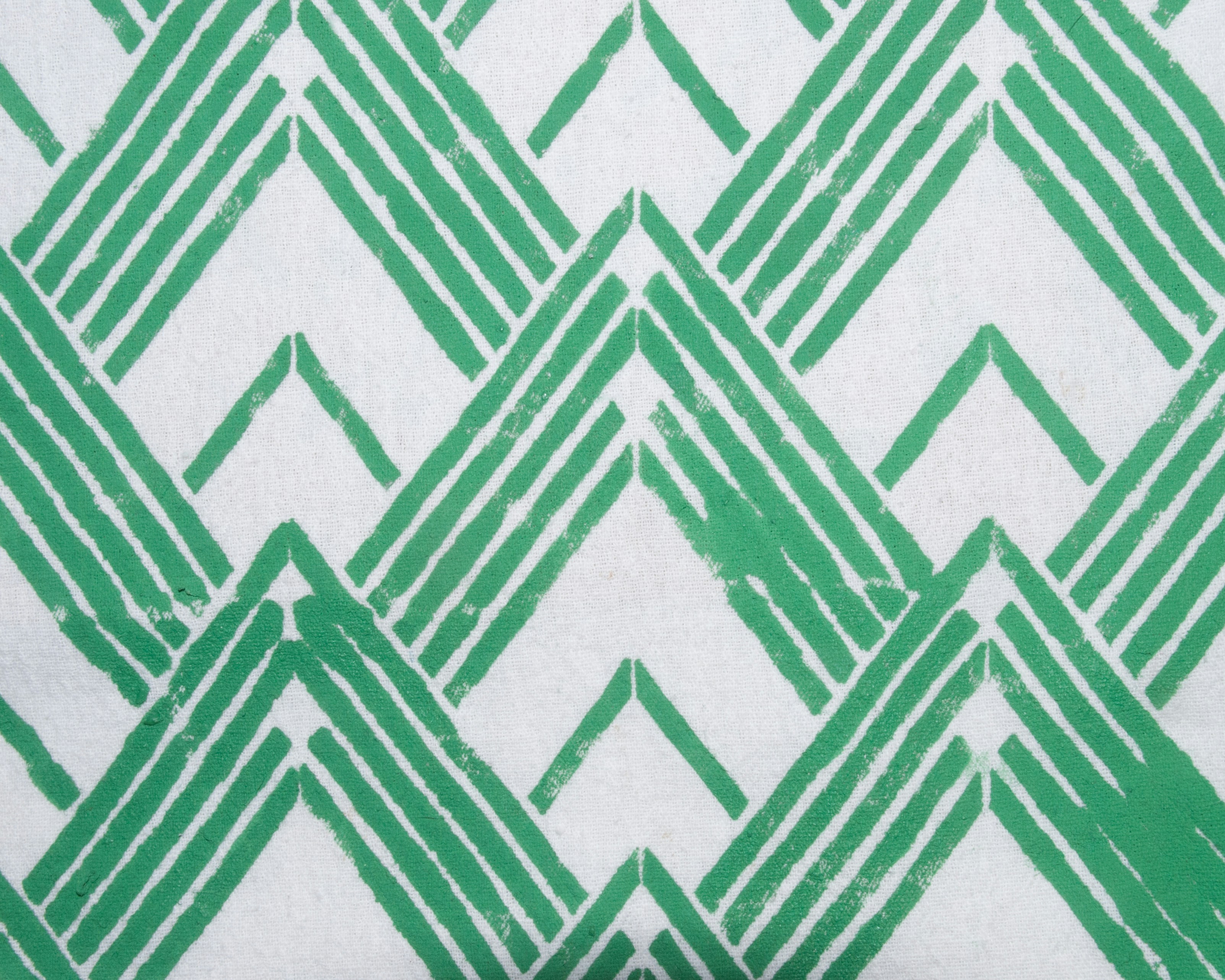 Chevron Echoes: Mint-Green Tessellation of Interlocking Arrows