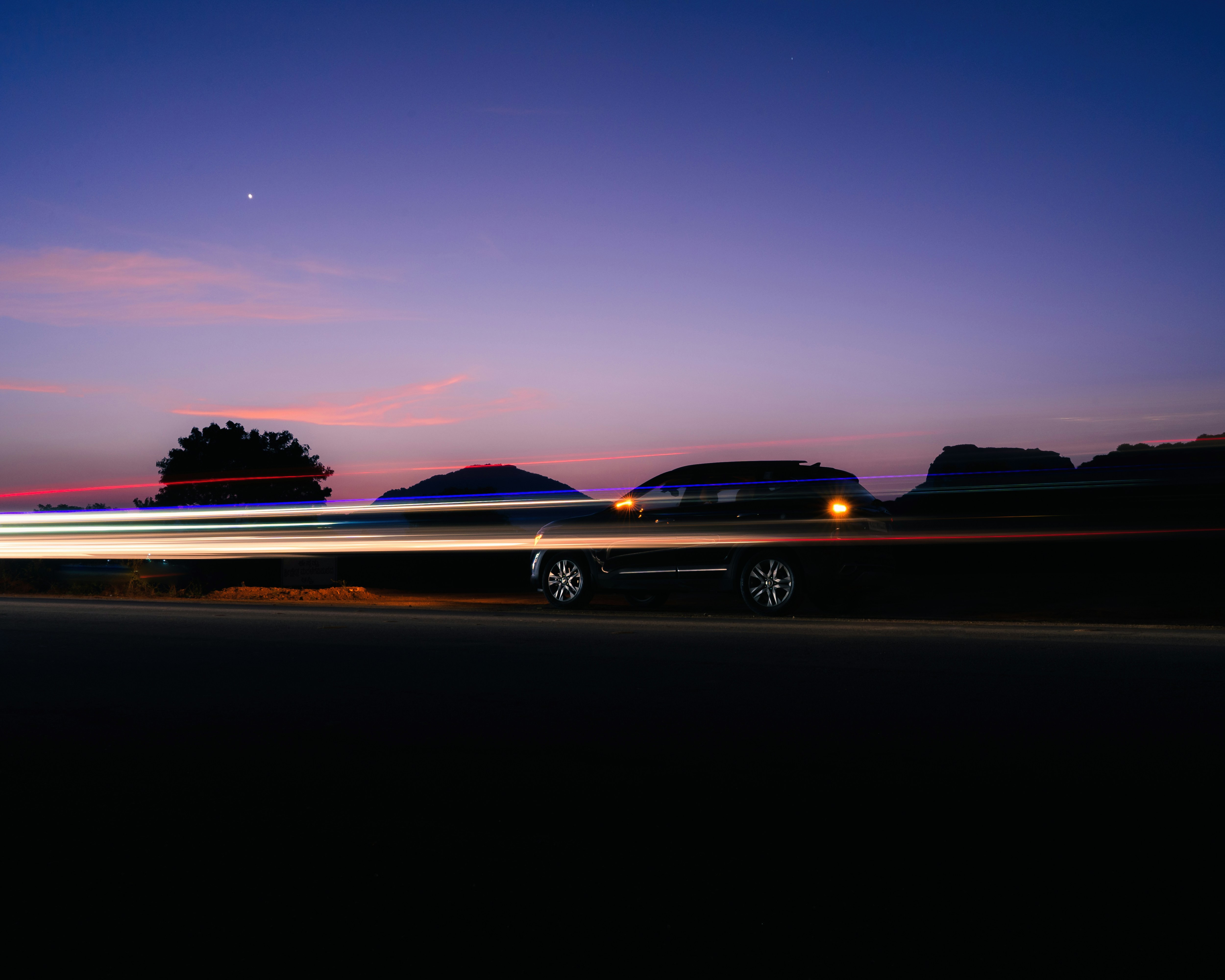 Twilight Streaks Over a Quiet Highway