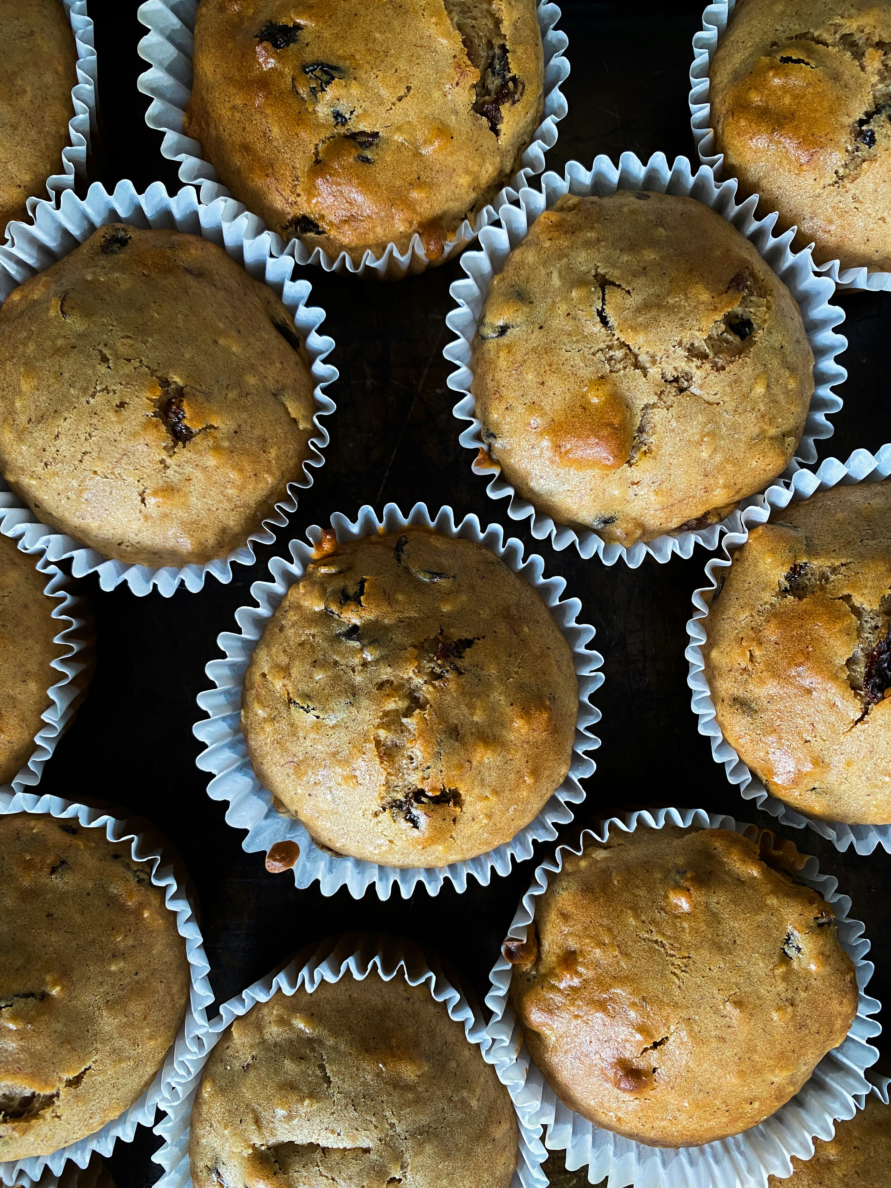 A bunch of muffins sitting on top of a table photo – Free Food Image on ...